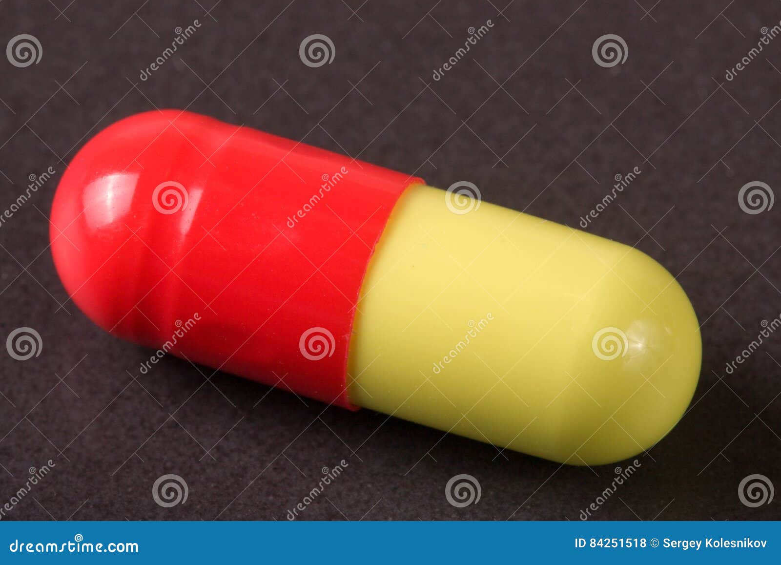 Macro of Red and Yellow Capsule Pill Isolated Stock Photo - Image of ...