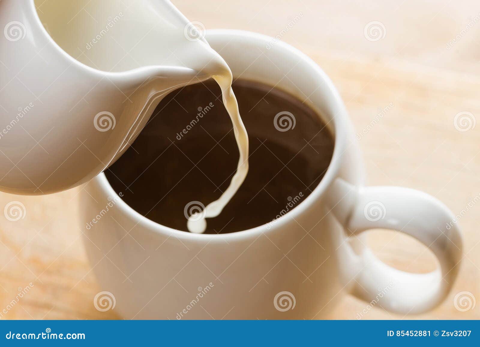 Macro Shoot Pouring Cream into a White Cup of Hot Morning Coffee. Stock ...