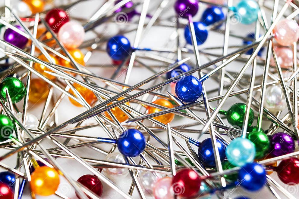 Macro Shot Background of Multicolored Sewing Needles with Colored Beads ...