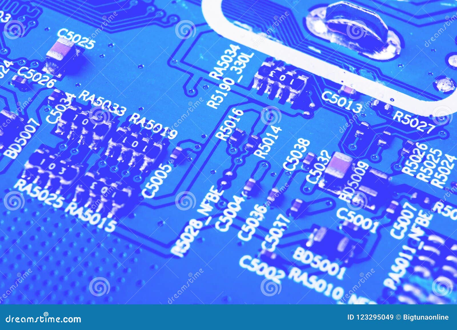 Macro Shot of a Circuitboard with Resistors Microchips and Electronic ...