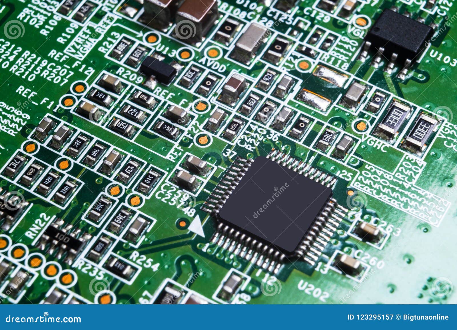 Macro Shot of a Circuitboard with Resistors Microchips and Electronic ...