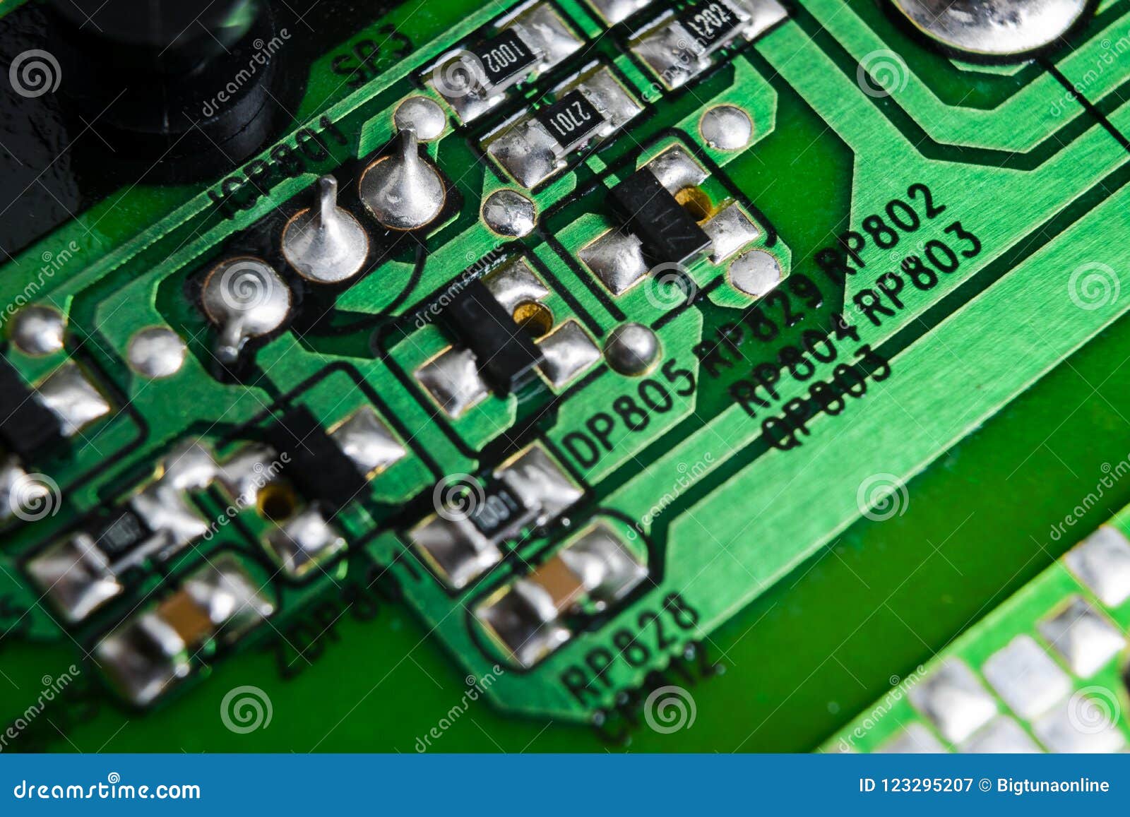 Macro Shot of a Circuitboard with Resistors Microchips and Electronic ...