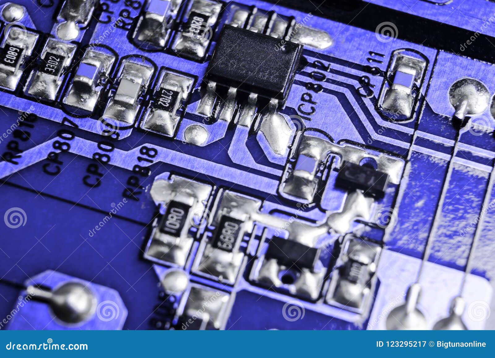 Macro Shot of a Circuitboard with Resistors Microchips and Electronic ...