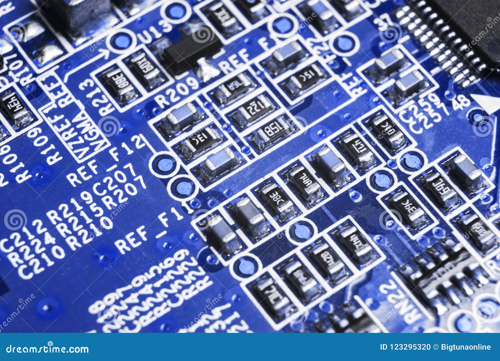 Macro Shot of a Circuitboard with Resistors Microchips and Electronic ...