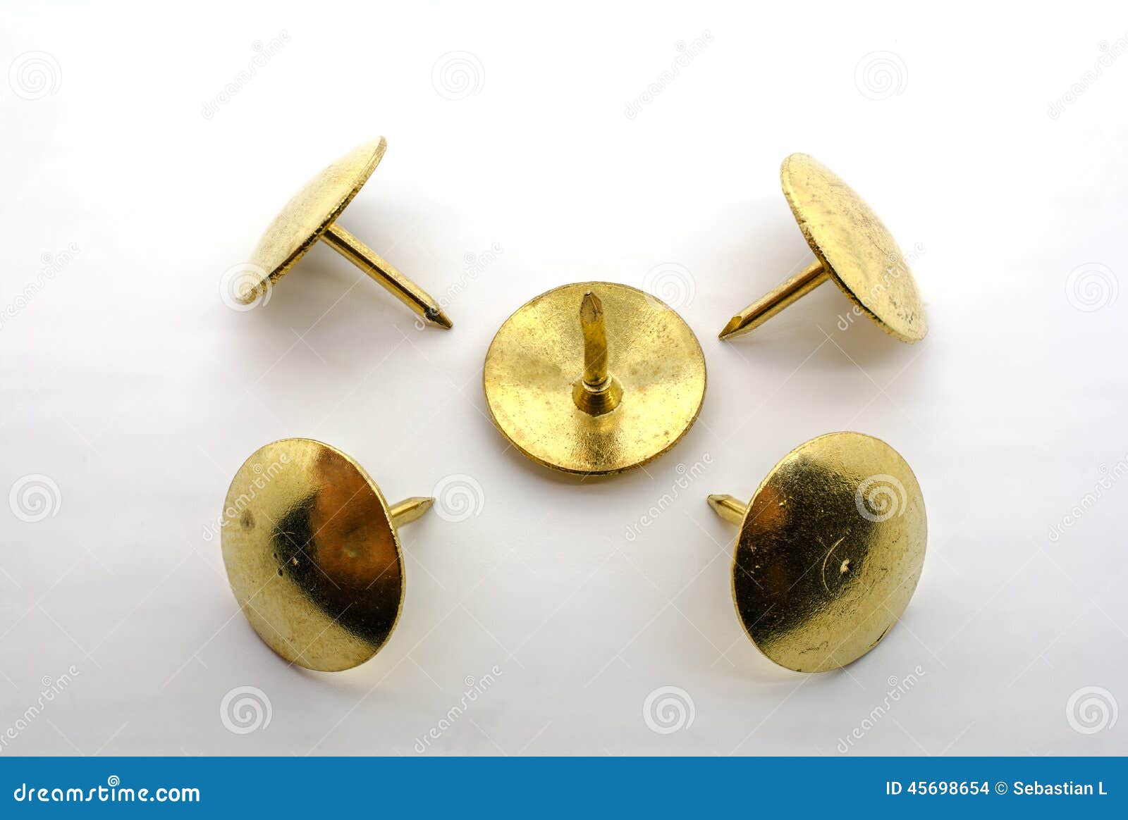 A Macro Shot of a Collection of Five Thumbtacks Stock Photo - Image of ...