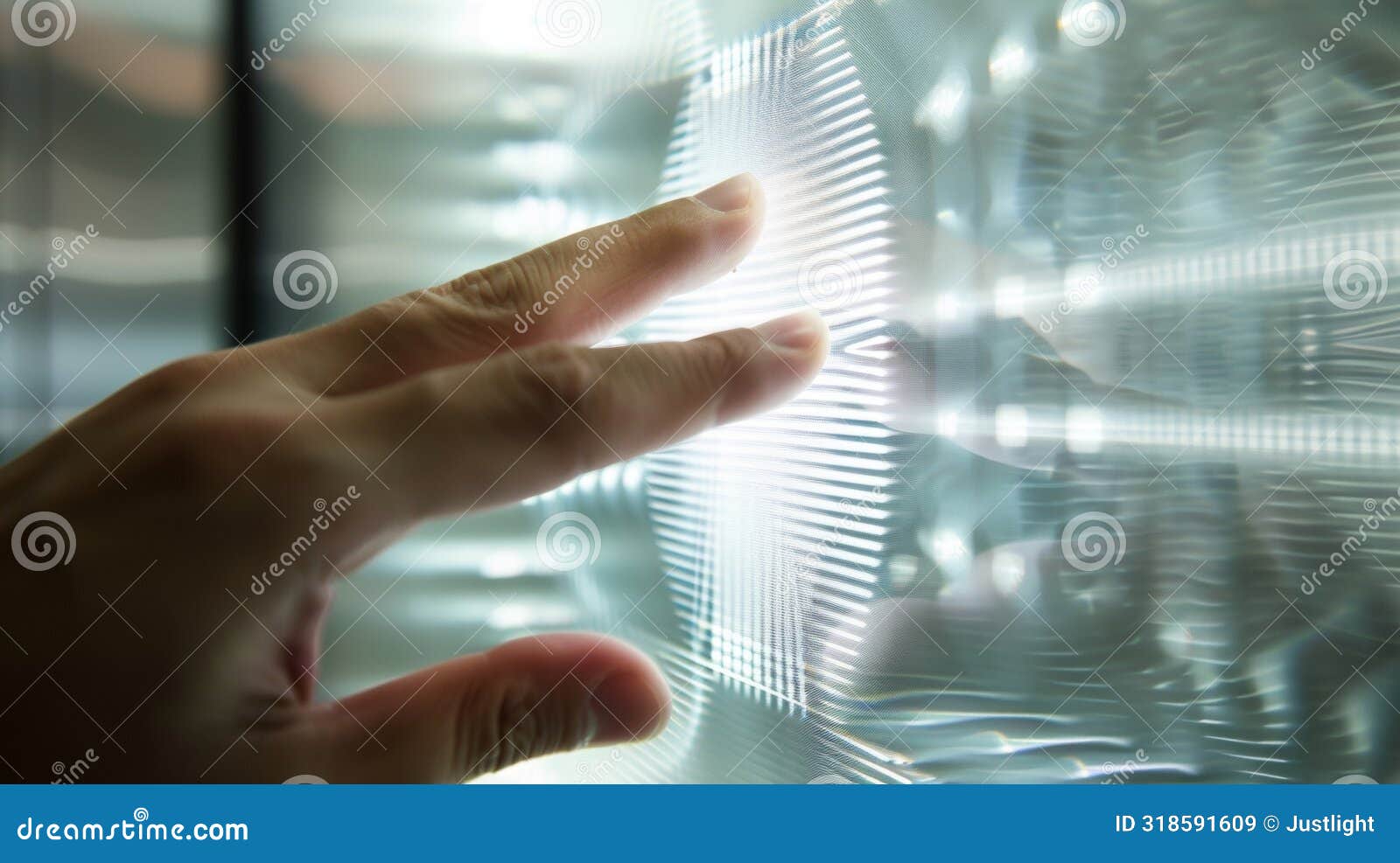 A Macro Shot of a Finger Pressing Down on the Activation Button of a ...