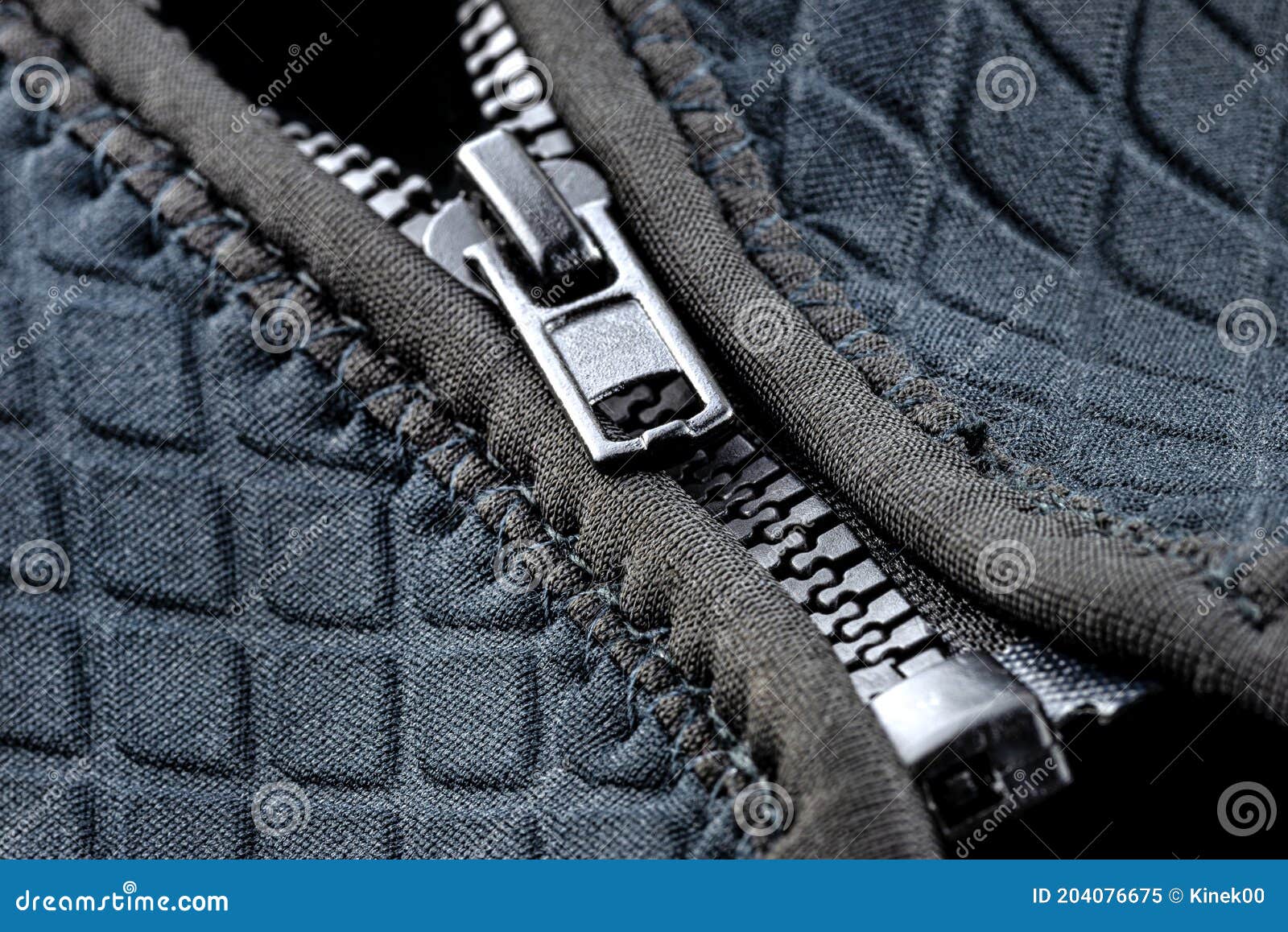 Macro Shot of a Half-closed, Plastic Zipper in a Modern Blue Garment ...