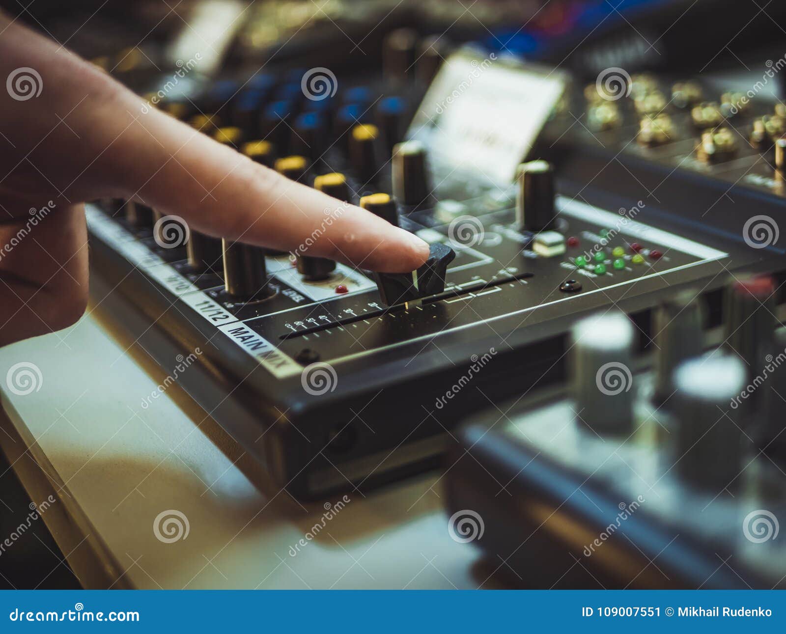 Macro Shot of the Hand Adjusting the Volume Fader Stock Image - Image ...