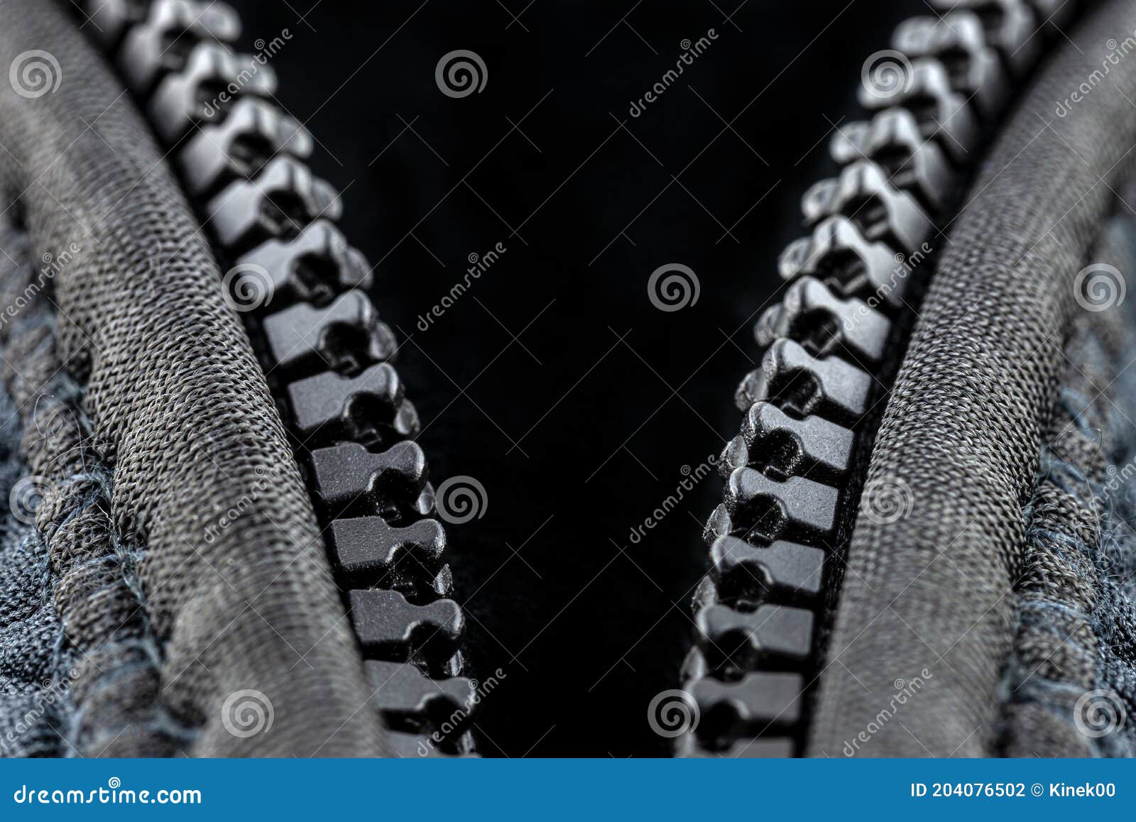 A Macro Shot of a Open, Plastic Zipper in a Modern Blue Garment. Stock ...
