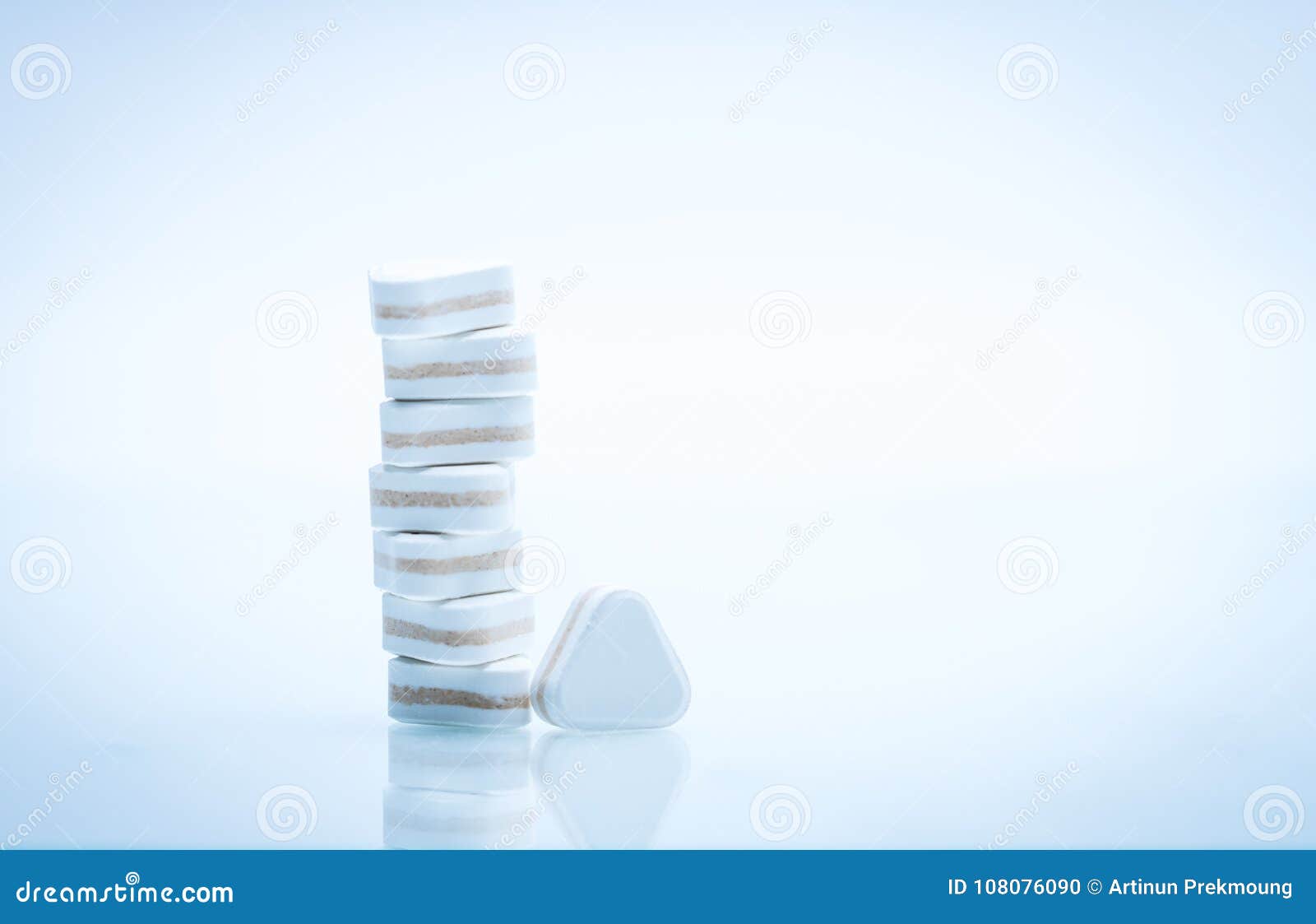 Macro Shot of Triangle Shape Tablet Pills. Three Layers Tablet Stock ...