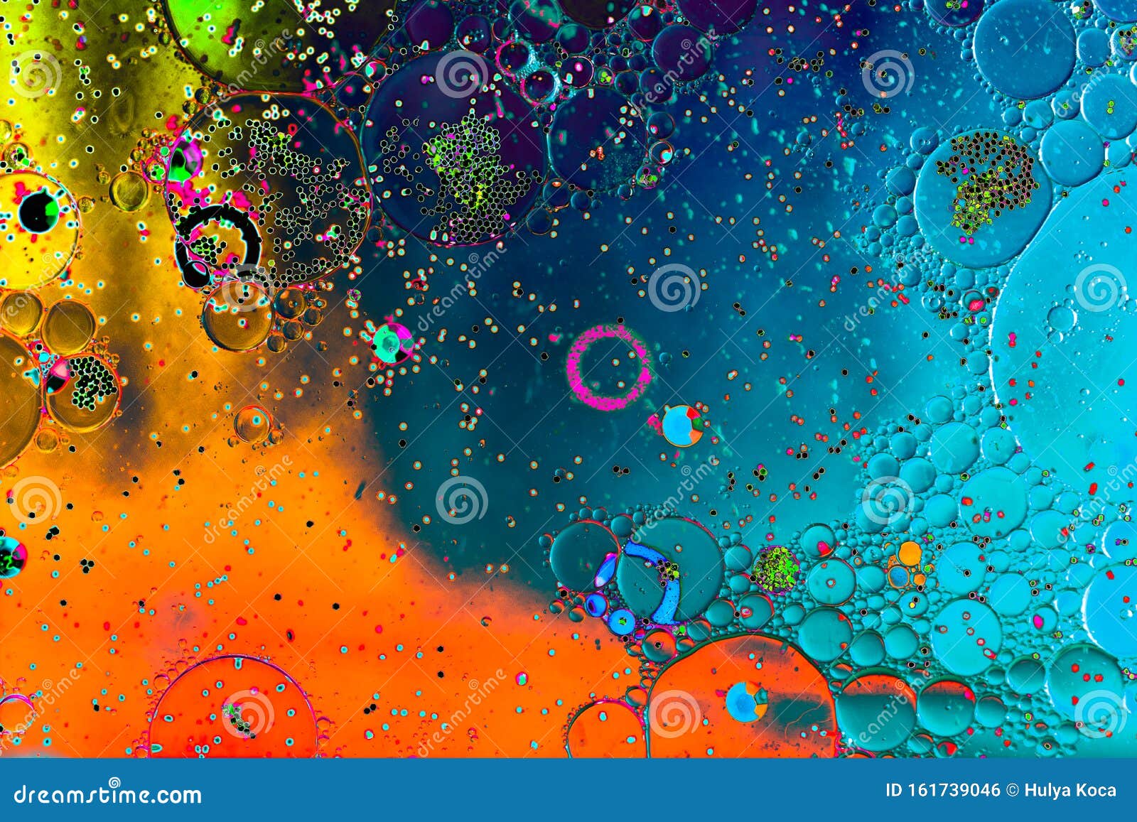 Macro Shot of Water Oil Emulsion Over Colored Background Stock Photo ...