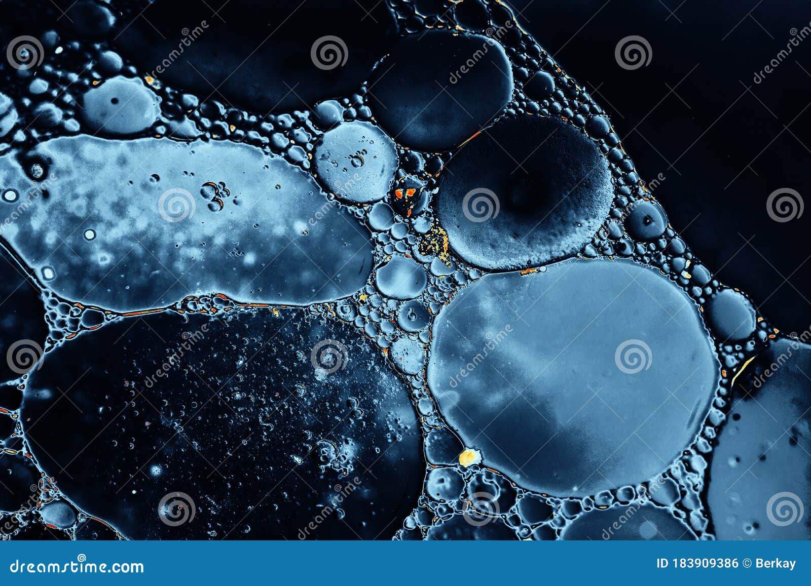 Macro Shot of Water Oil Emulsion Over Colored Background Stock Photo ...