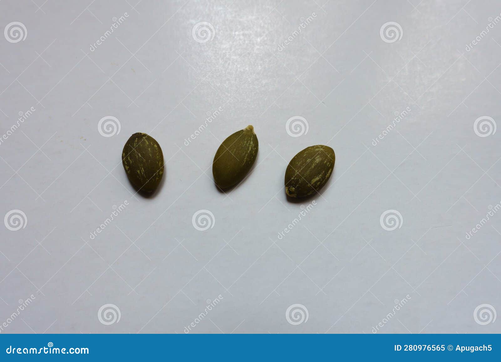 Macro of 3 Hulled Kernels of Pumpkin Seeds Stock Image - Image of ...
