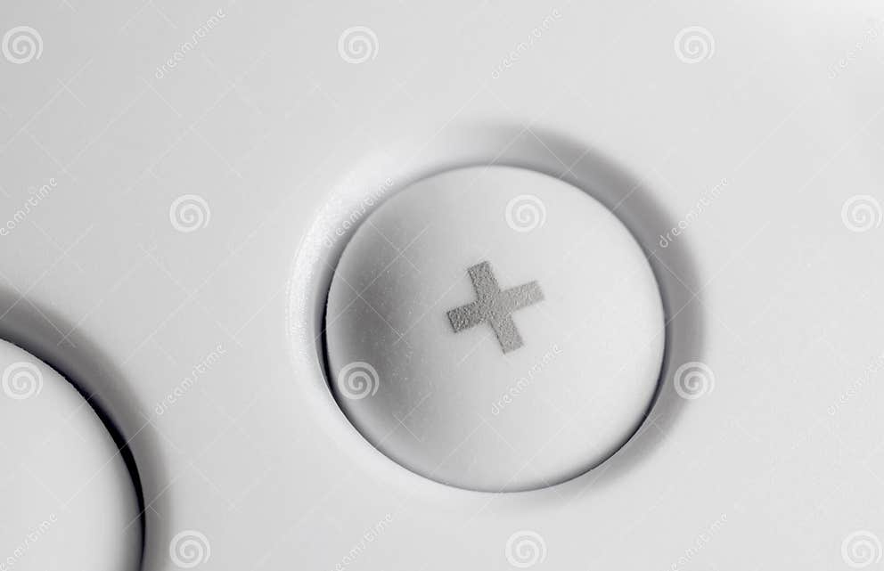 Macro of a White Plus Button Stock Image - Image of curved, current ...