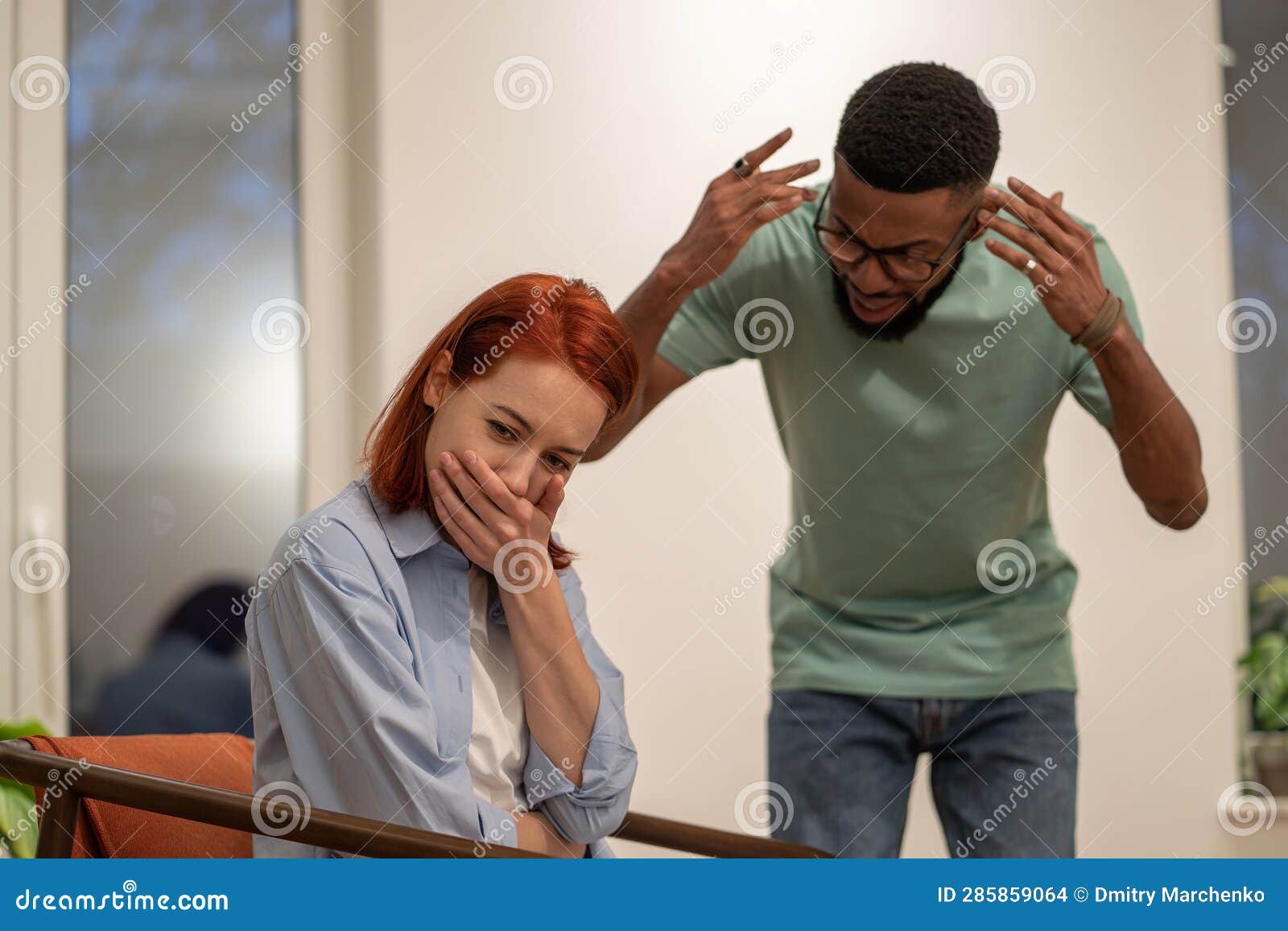 Mad Angry African American Man Husband Blaming And Shaming Wife At Home