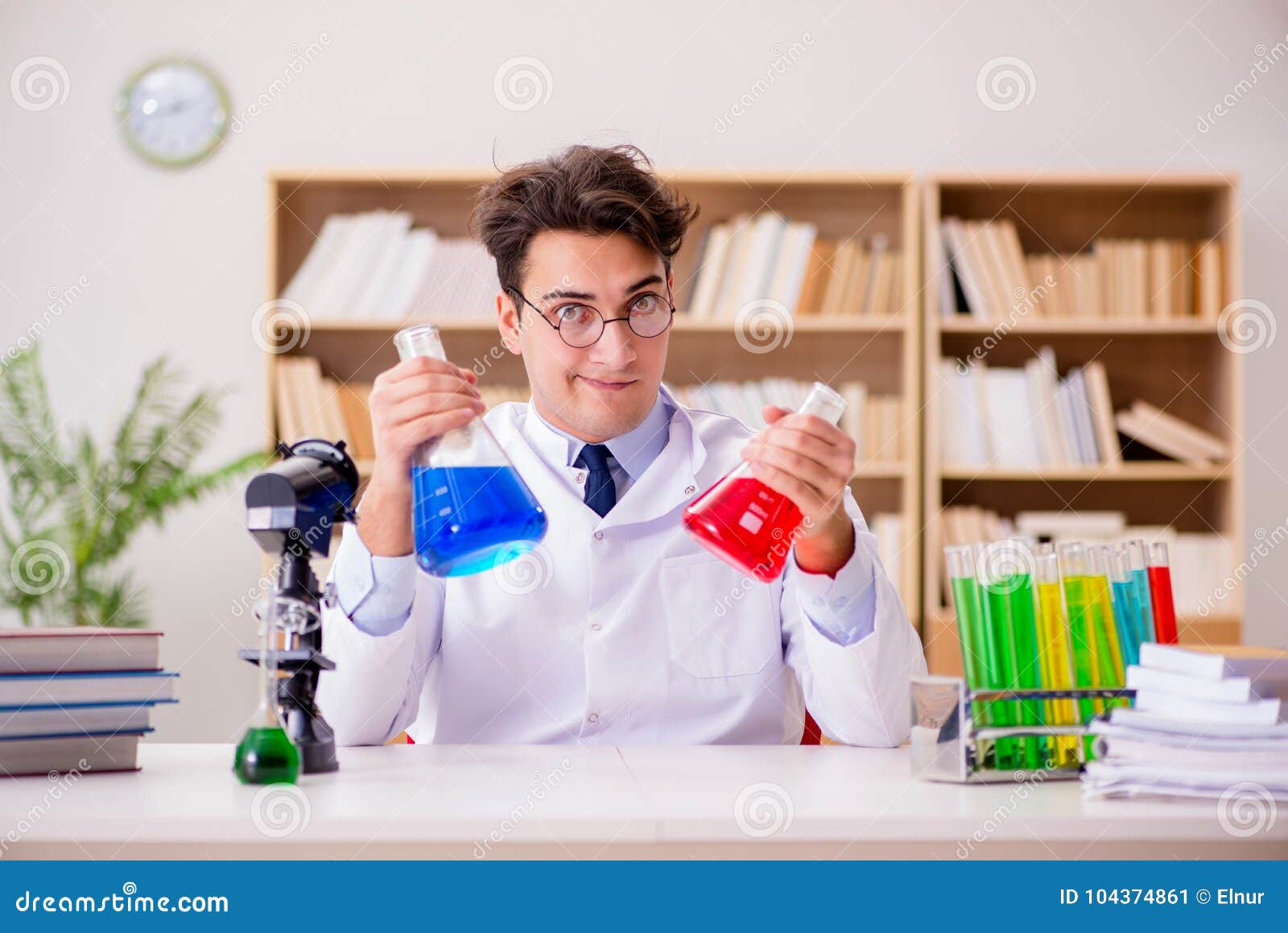 The Mad Crazy Scientist Doctor Doing Experiments in a Laboratory Stock ...