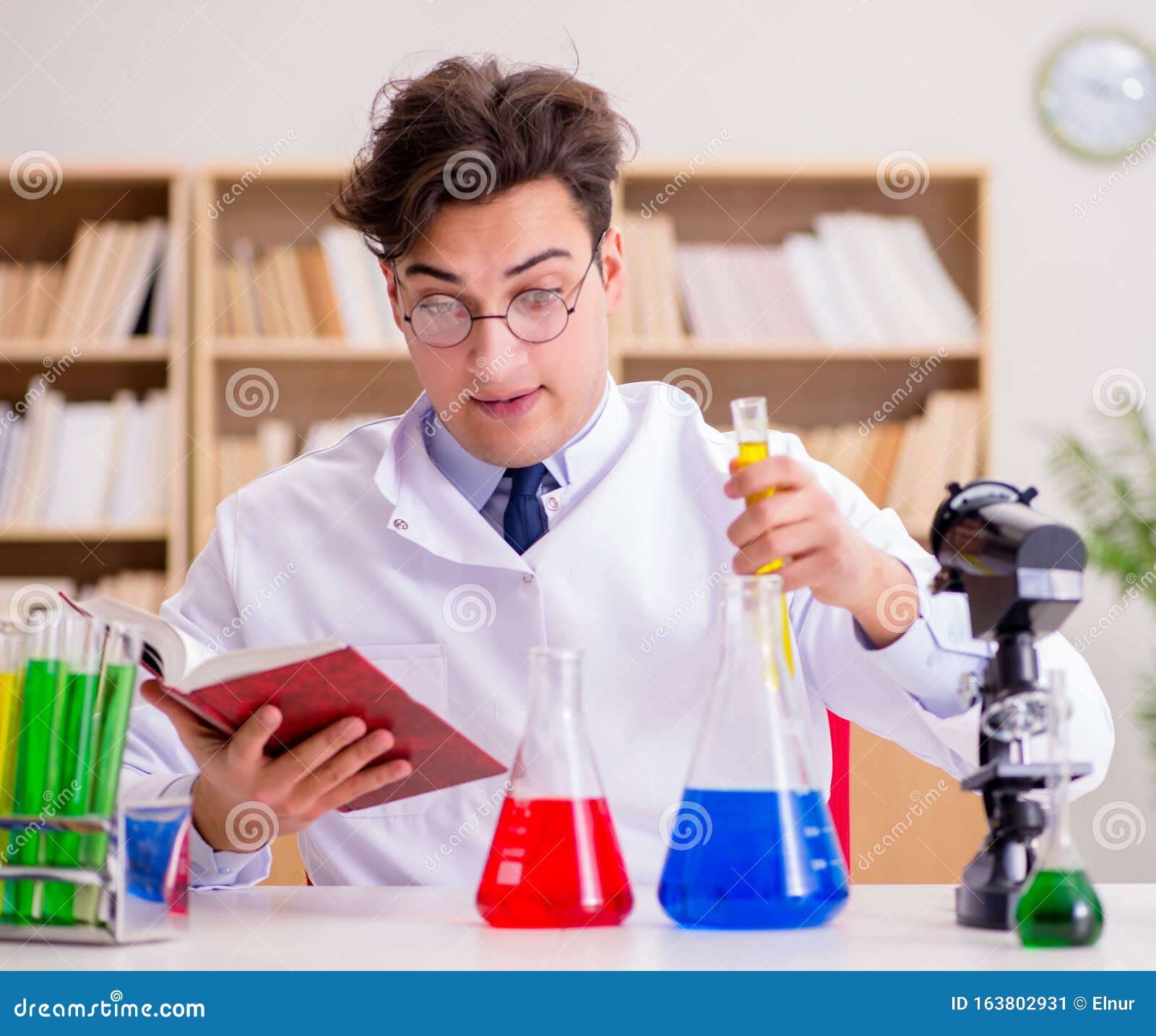 Mad Crazy Scientist Doctor Doing Experiments in a Laboratory Stock ...