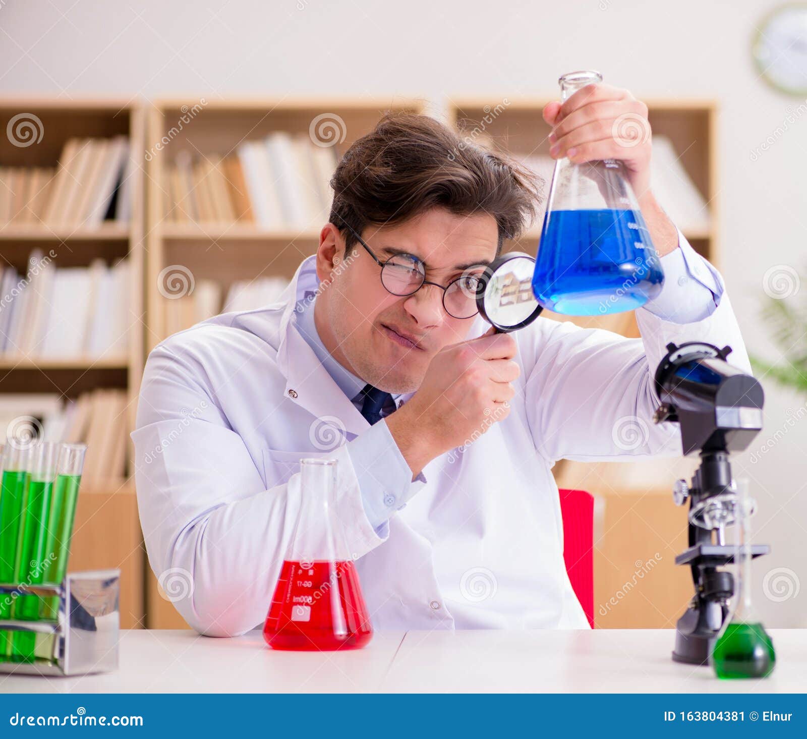 Mad Crazy Scientist Doctor Doing Experiments in a Laboratory Stock ...