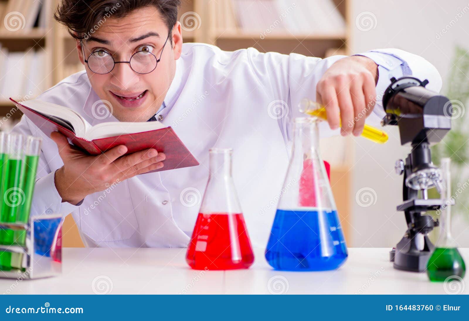Mad Crazy Scientist Doctor Doing Experiments in a Laboratory Stock ...