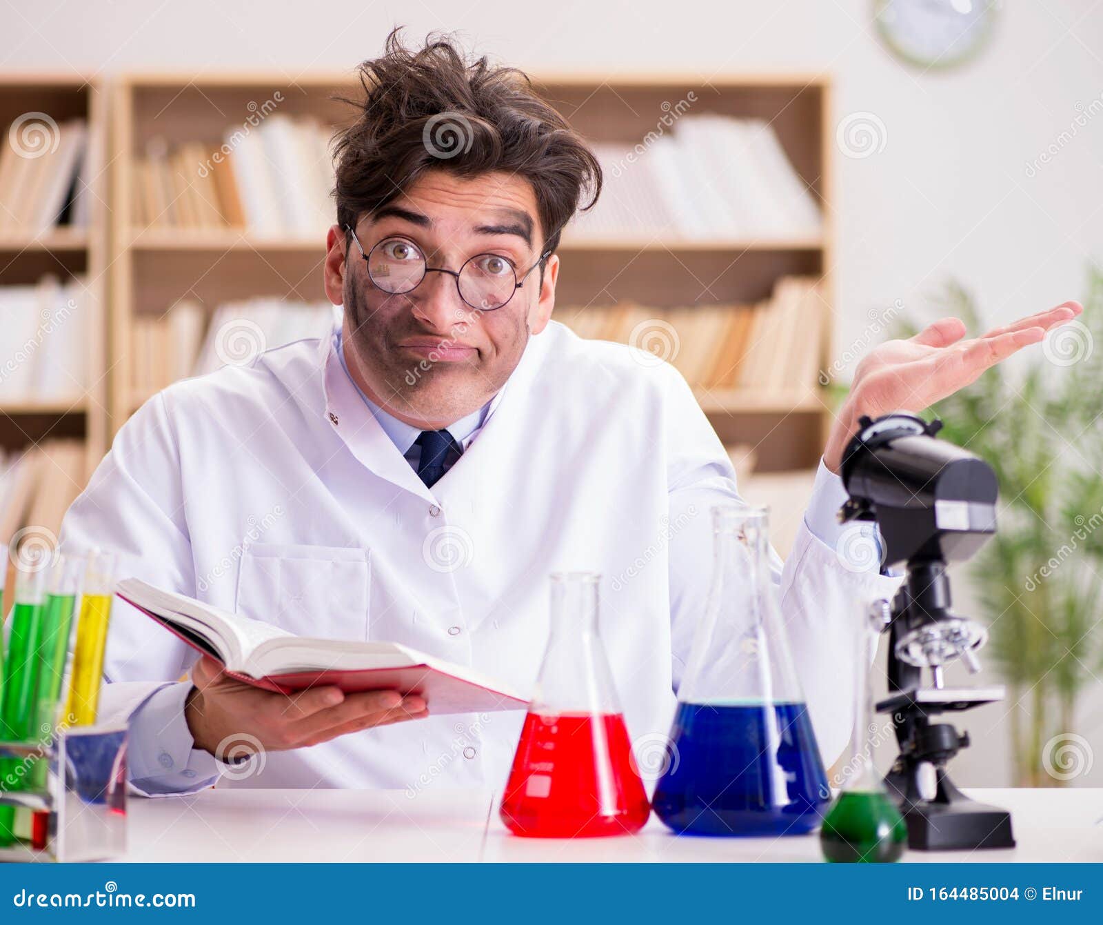 Mad Crazy Scientist Doctor Doing Experiments in a Laboratory Stock ...