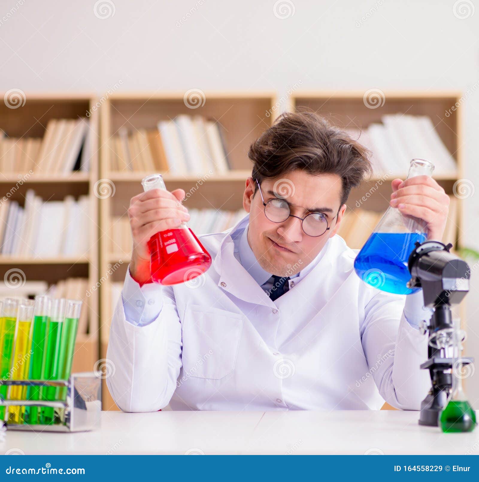 Mad Crazy Scientist Doctor Doing Experiments in a Laboratory Stock ...