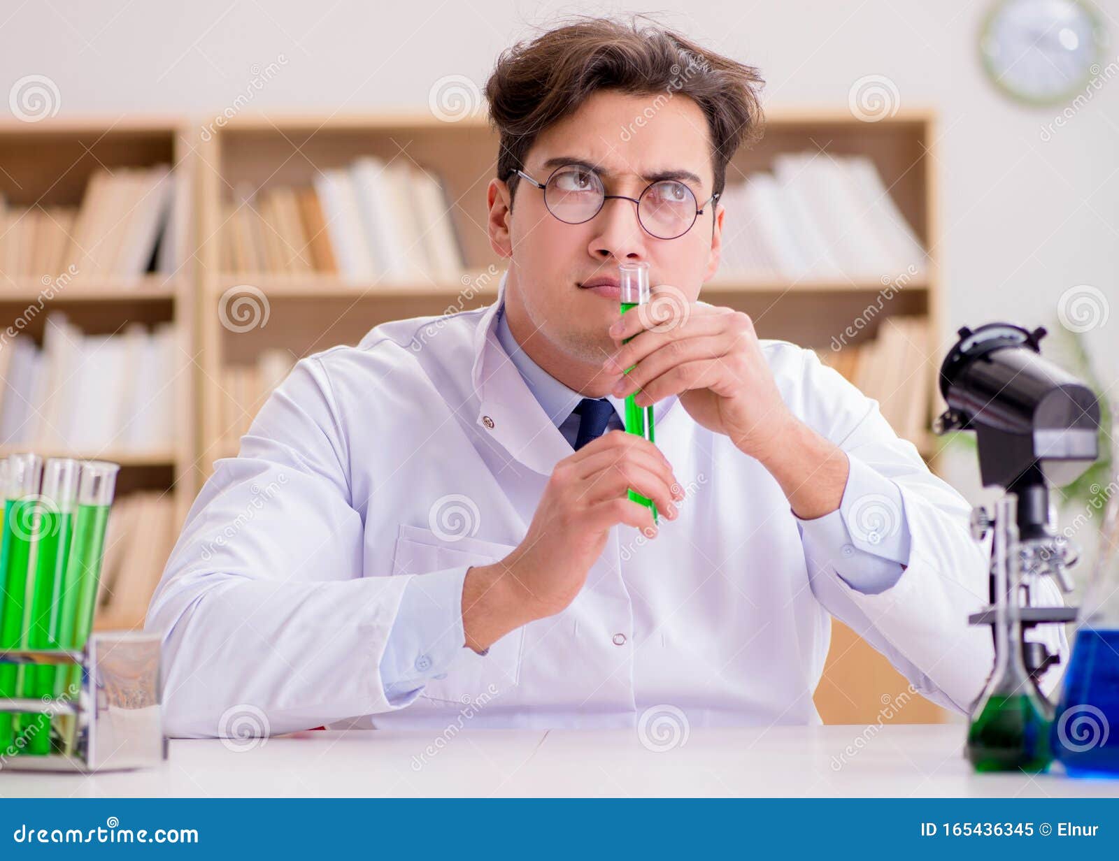 Mad Crazy Scientist Doctor Doing Experiments in a Laboratory Stock ...