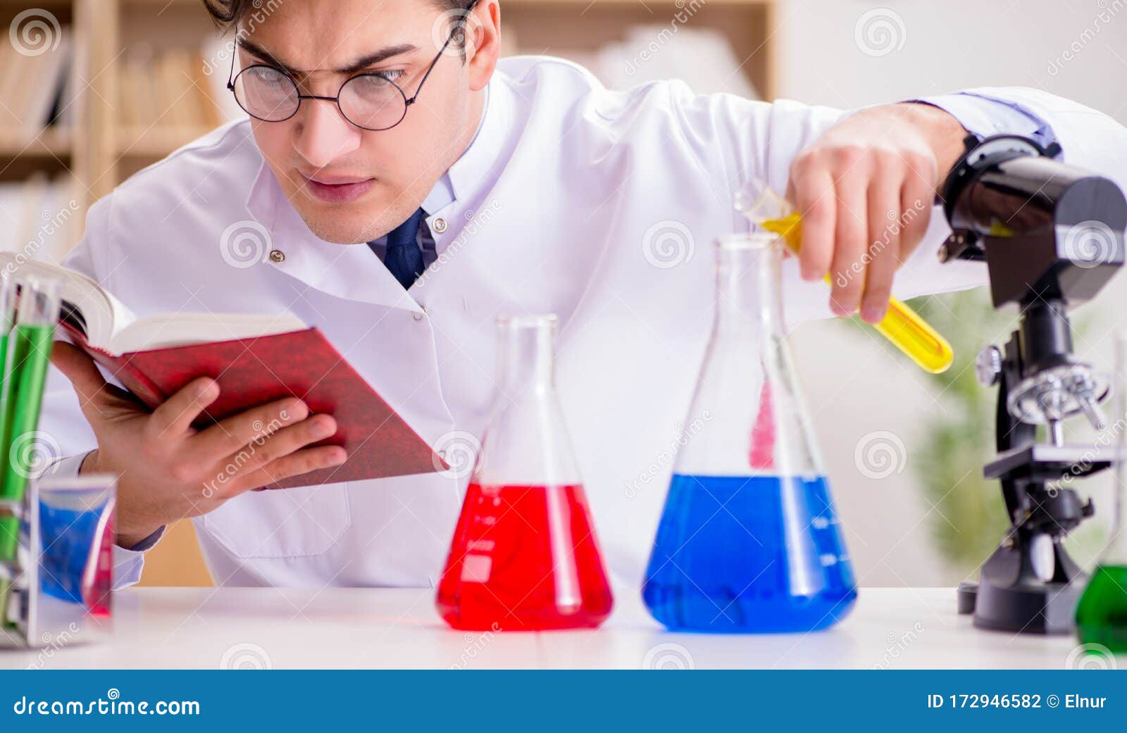 Mad Crazy Scientist Doctor Doing Experiments in a Laboratory Stock ...