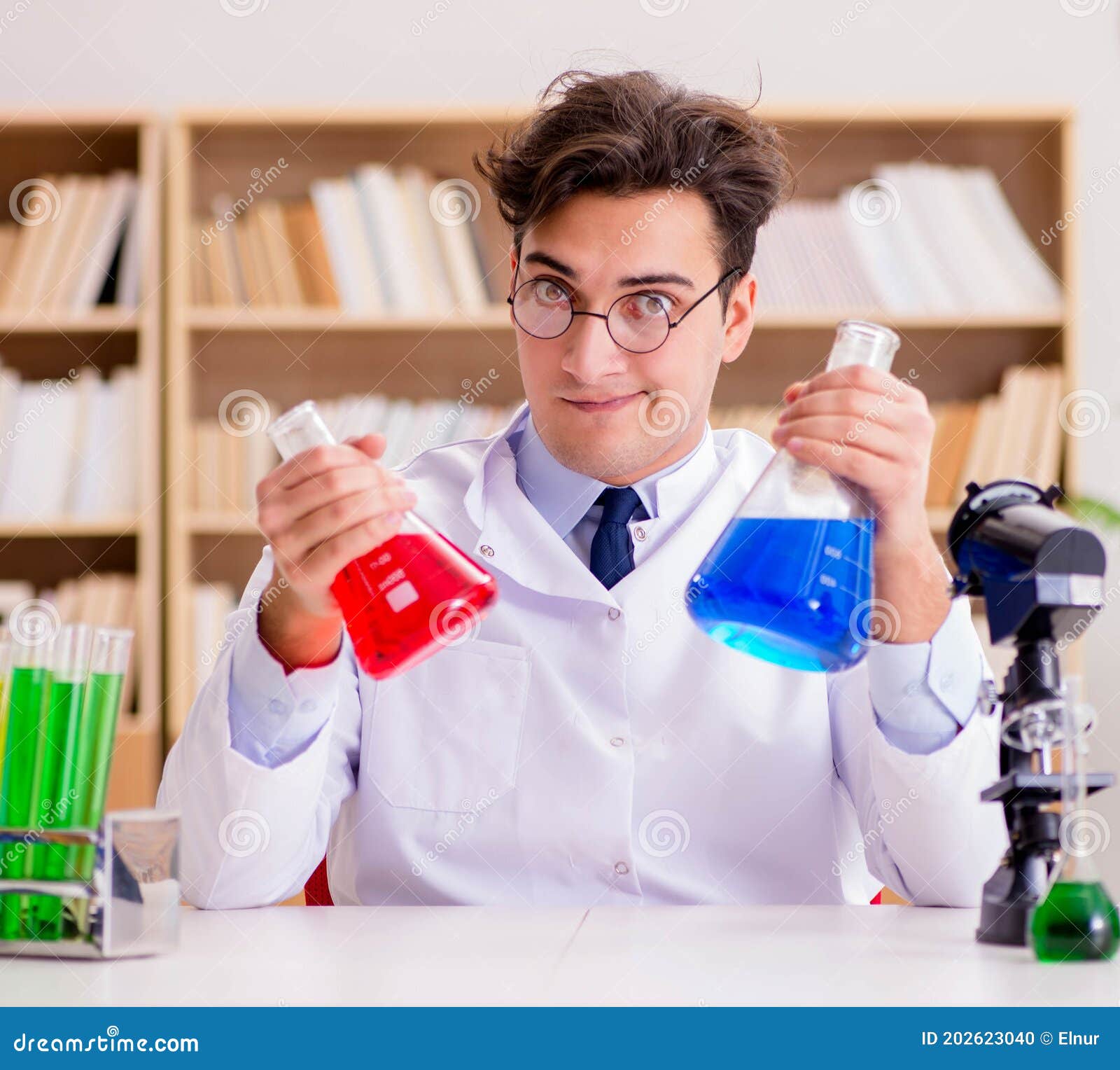 Mad Crazy Scientist Doctor Doing Experiments in a Laboratory Stock ...