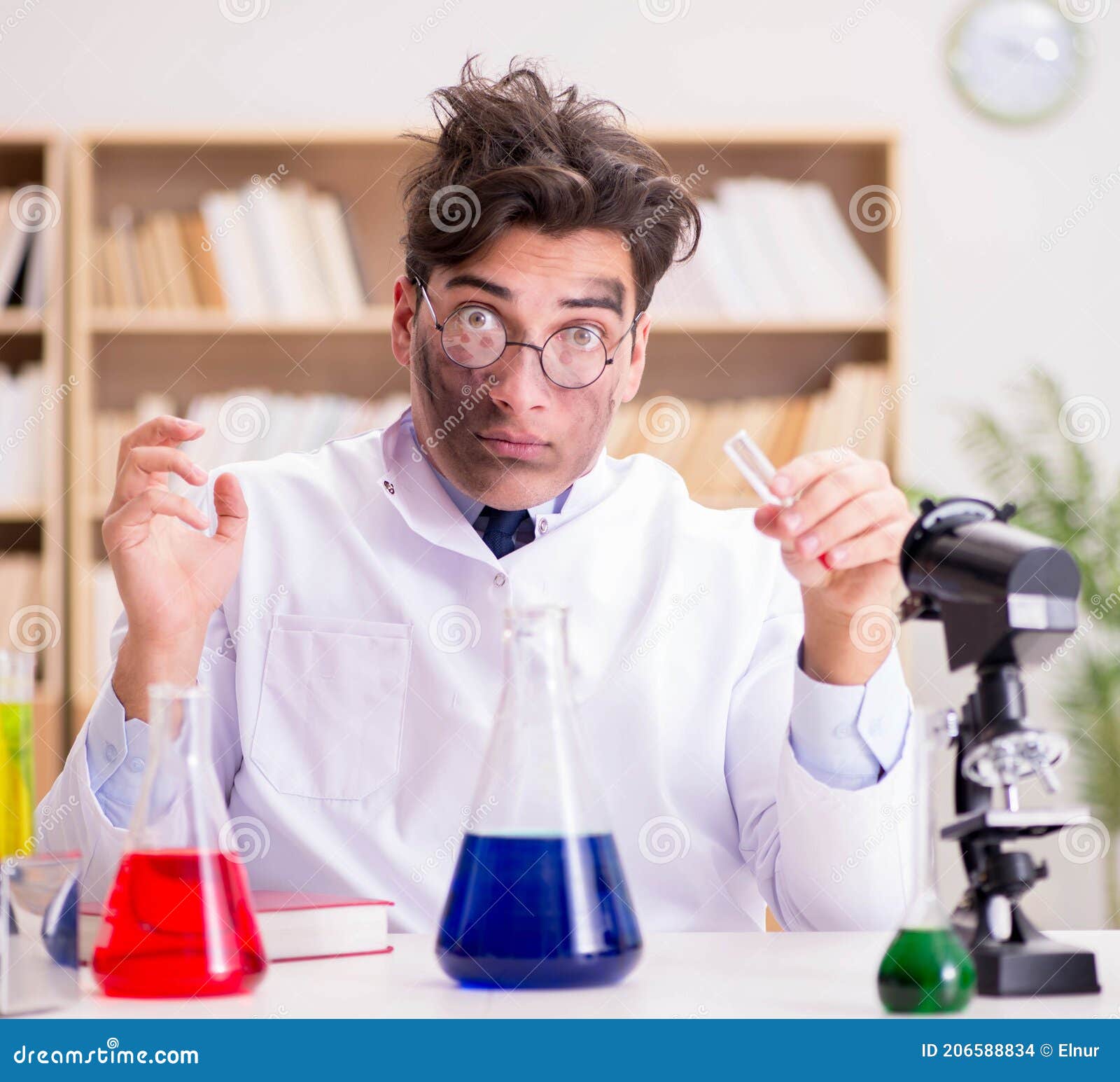 Mad Crazy Scientist Doctor Doing Experiments in a Laboratory Stock ...