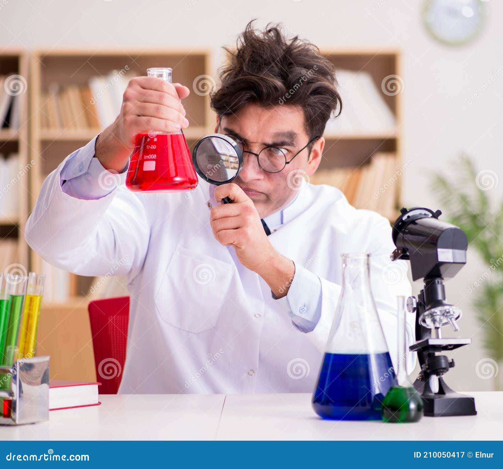 Mad Crazy Scientist Doctor Doing Experiments in a Laboratory Stock ...