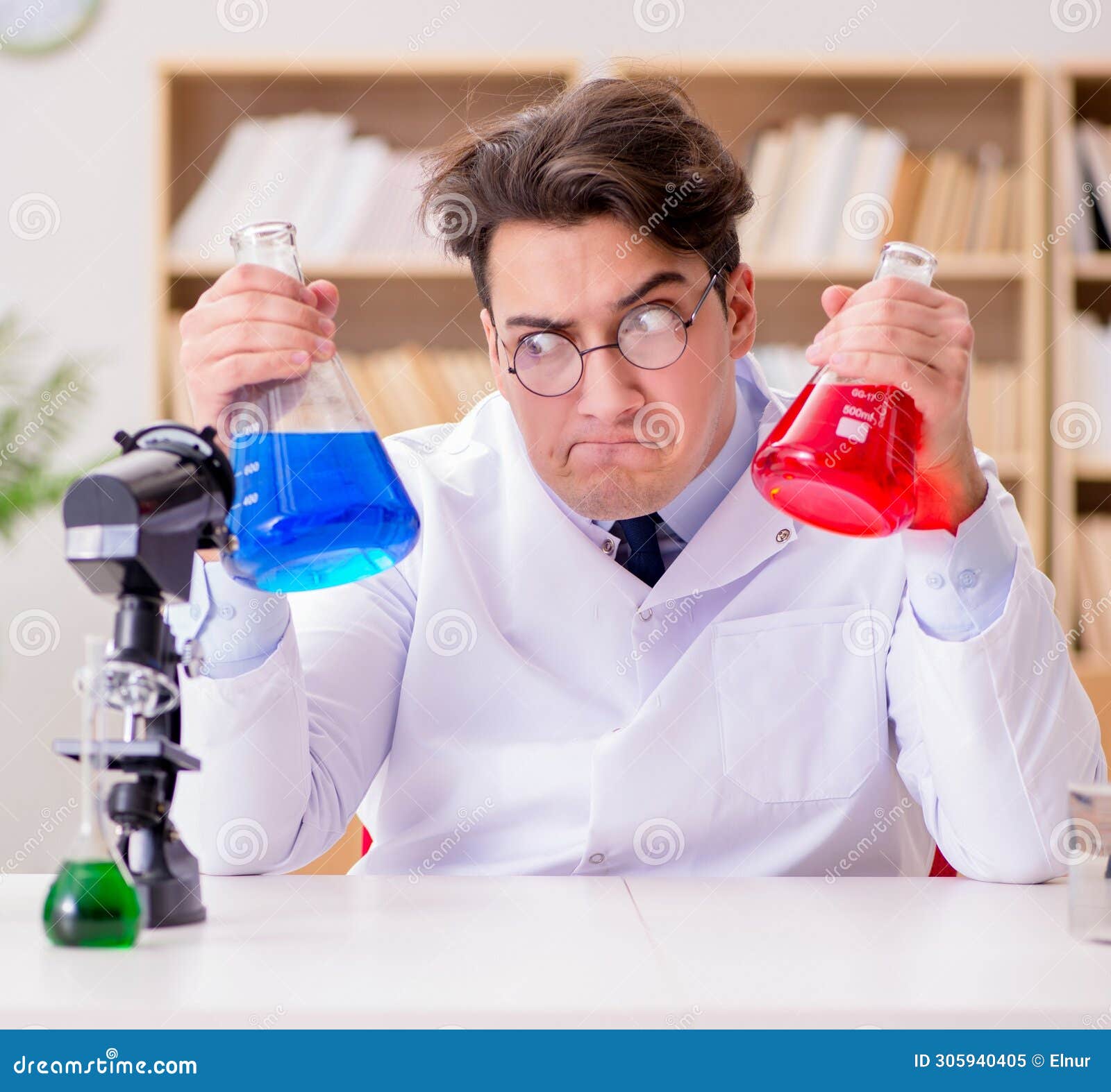 Mad Crazy Scientist Doctor Doing Experiments in a Laboratory Stock ...