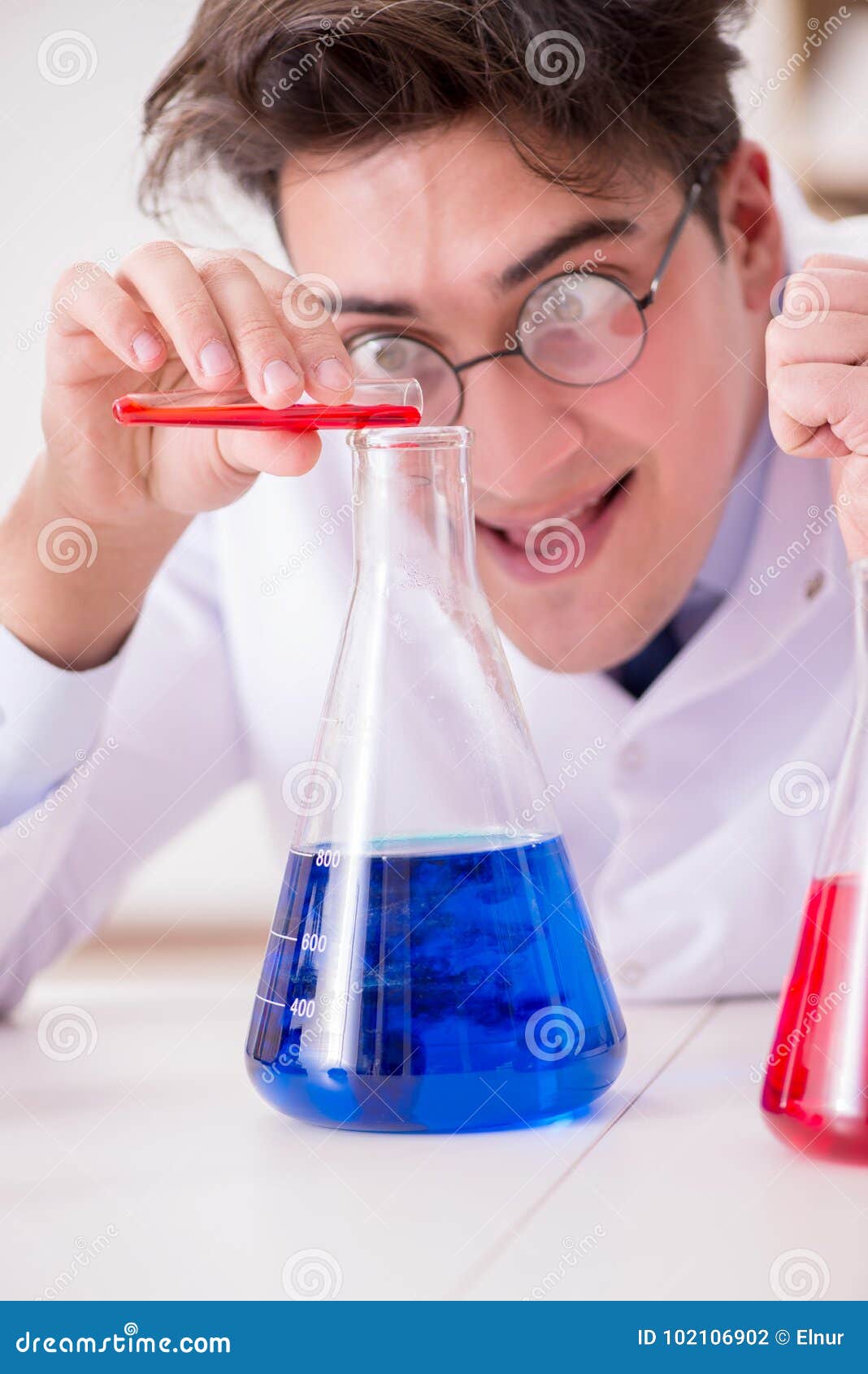 The Mad Crazy Scientist Doctor Doing Experiments in a Laboratory Stock ...