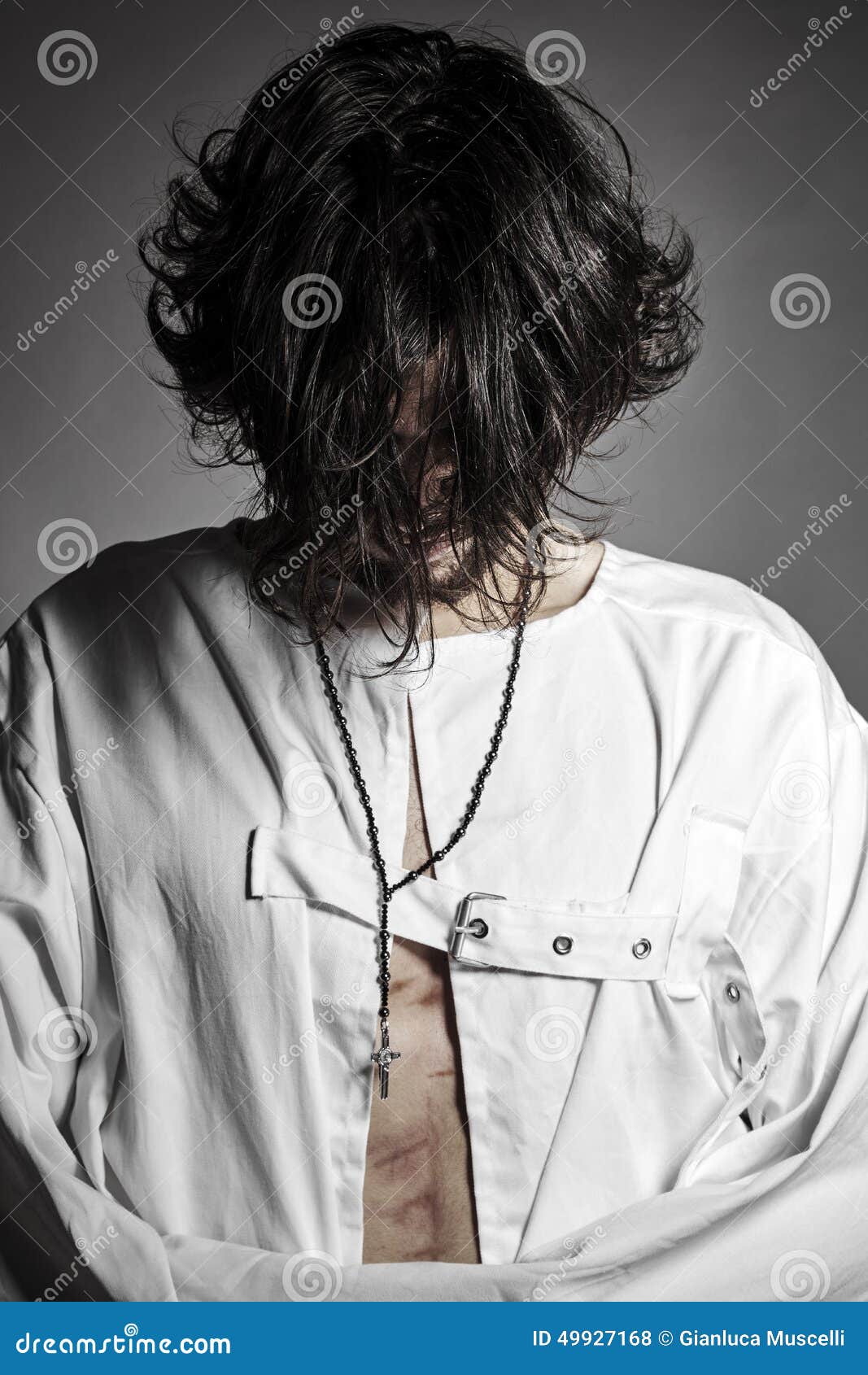 Mad Man with Straitjacket Looking Blankly Down Stock Photo - Image of ...