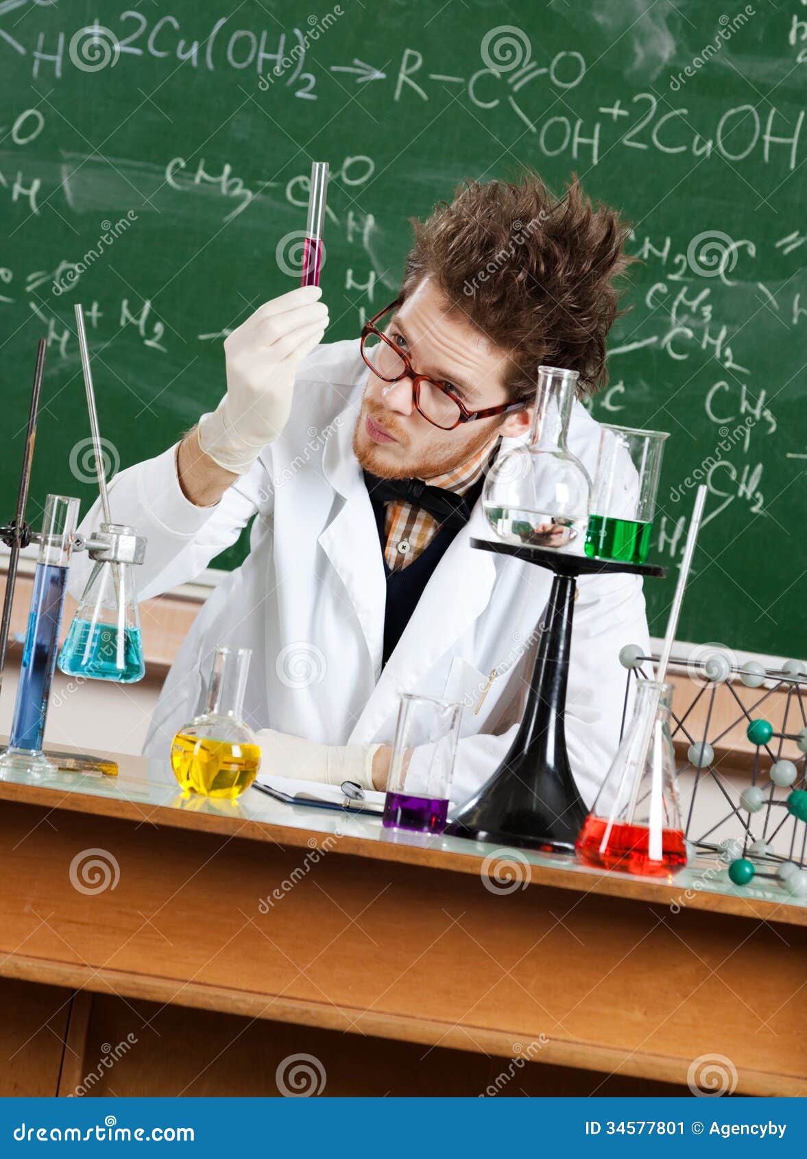 Mad Professor Examines a Beaker Stock Image - Image of bunsen, flasks ...