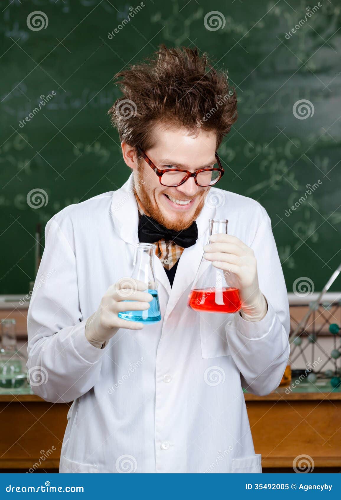 Mad Professor Laughs Keeping Two Flasks Stock Image - Image of ...