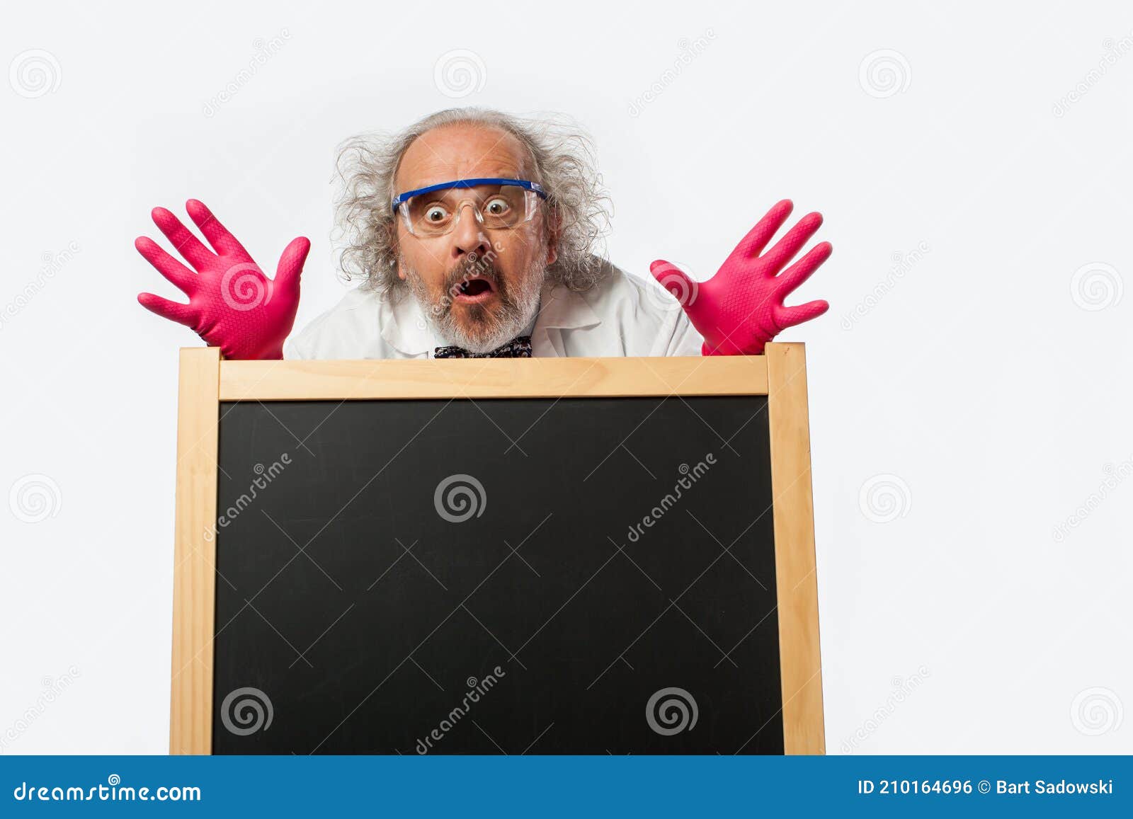 Mad Scientist Making Faces Behind a Blackboard Stock Photo - Image of ...