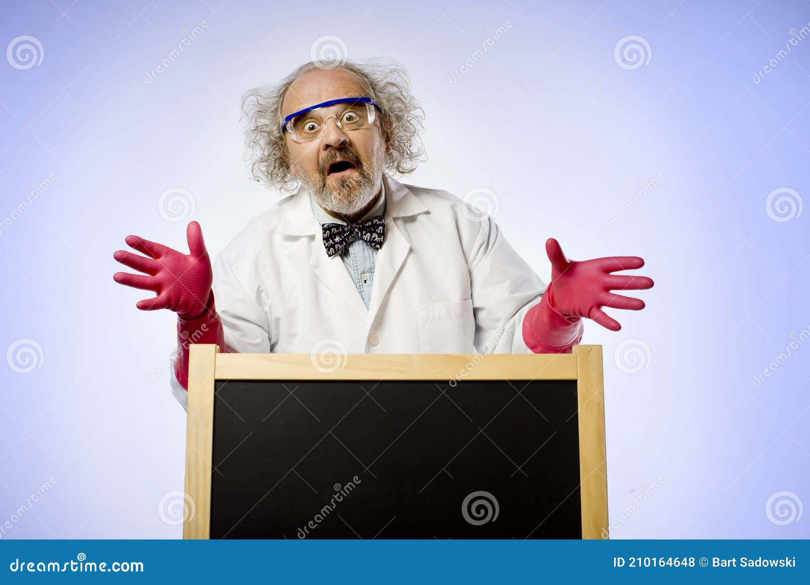 Mad Scientist Behind a Blackboard Making a Funny Face Stock Photo ...