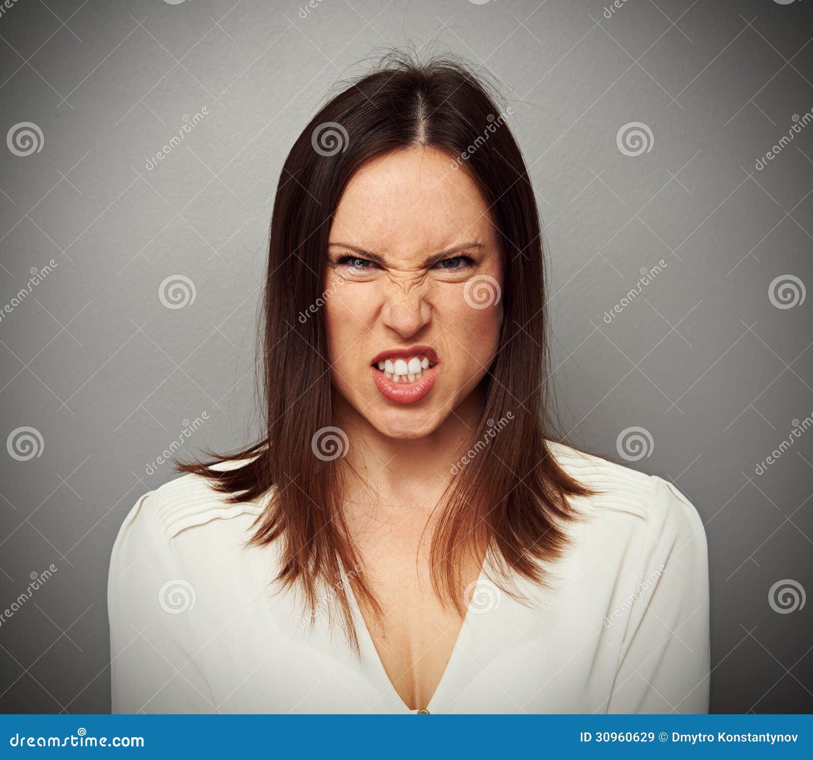 Mad woman baring her teeth stock image. Image of female - 30960629