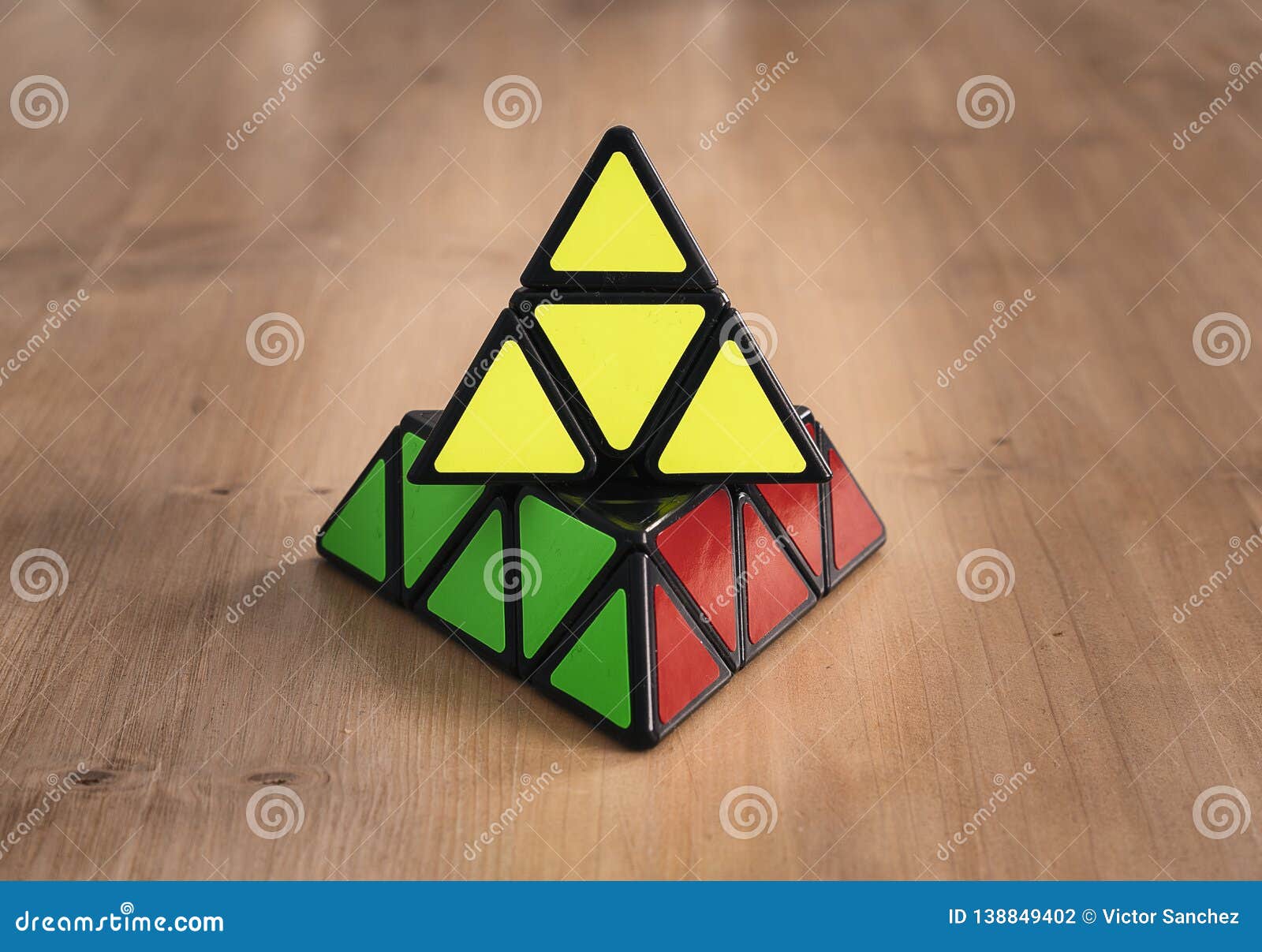 Madrid, Spain; 8 February 2019: Rubik Pyramidal Cube Solved in a Wood ...