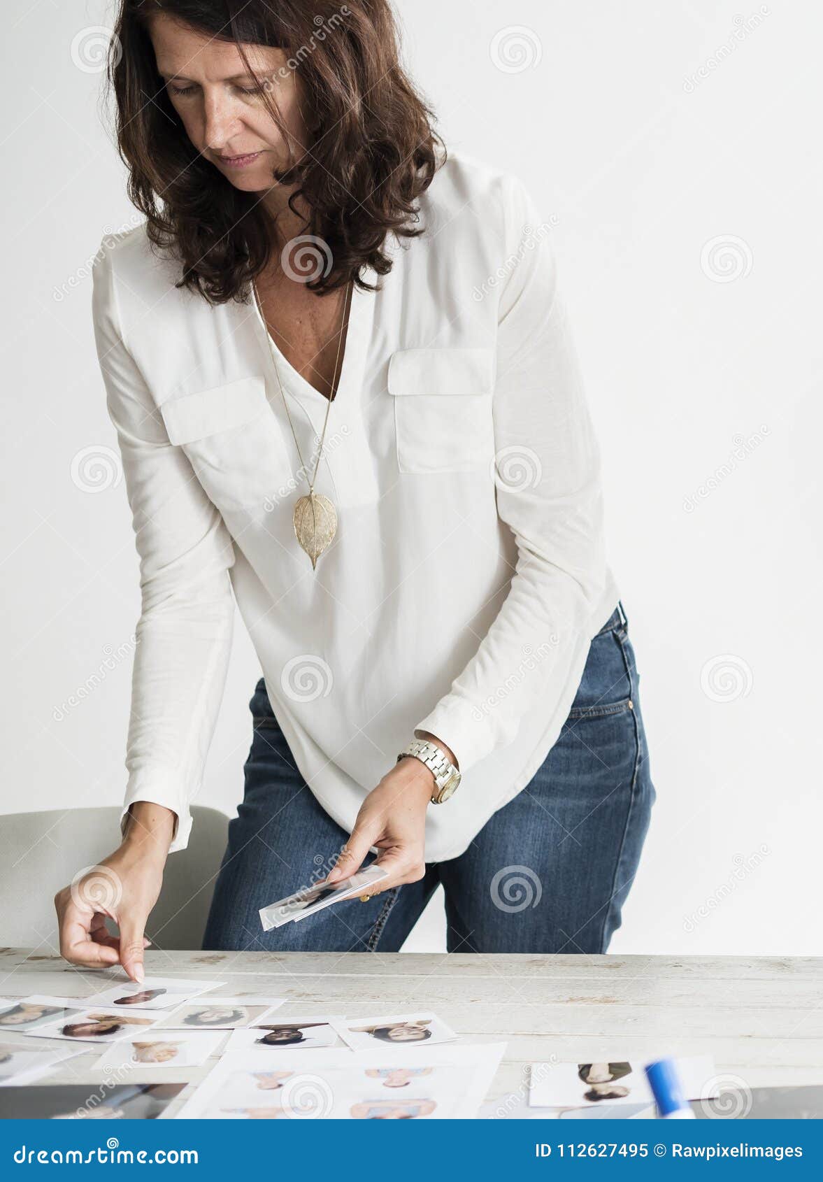 Magazine Editor Selecting Models Picture Stock Image - Image of editor ...