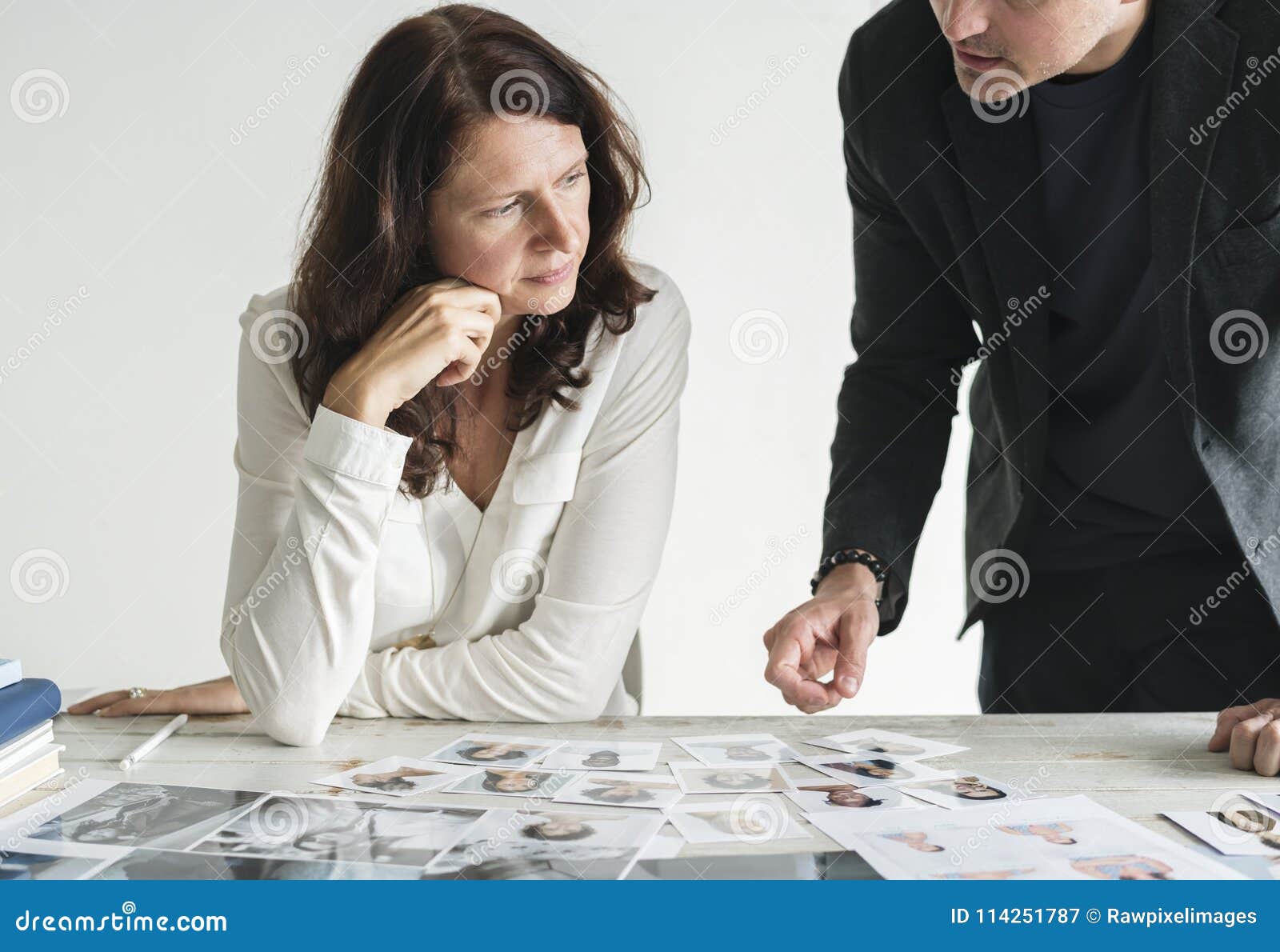 Magazine Editor Selecting Models Together Stock Image - Image of ...