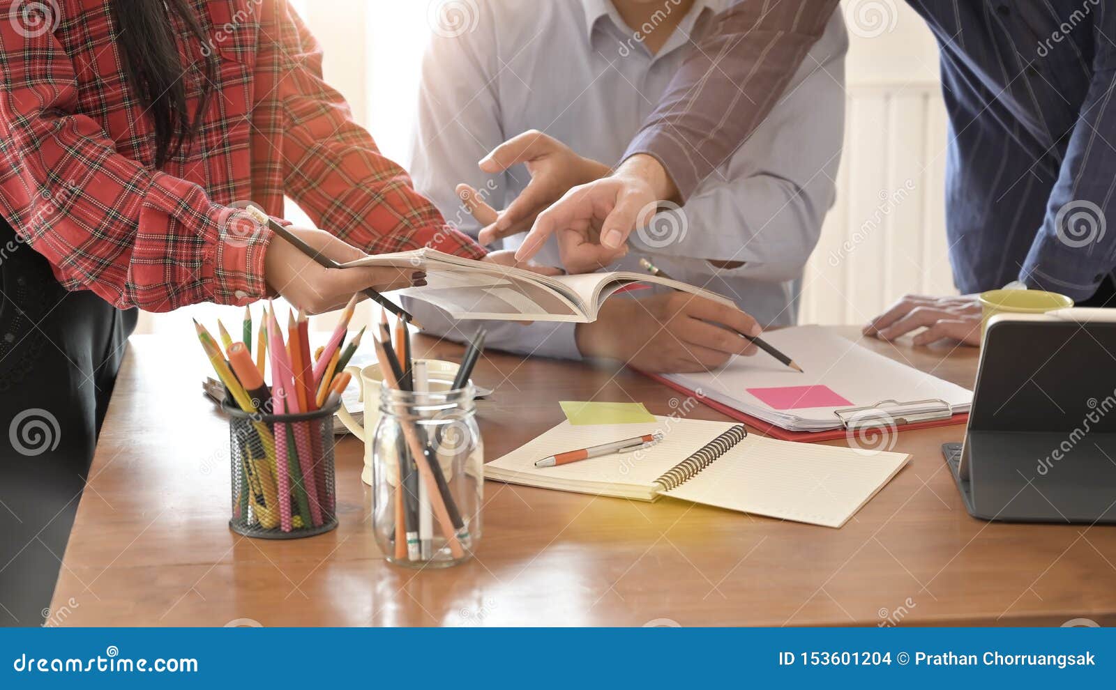 Magazine Editor Working and Meeting on Creative Workplace Stock Photo ...