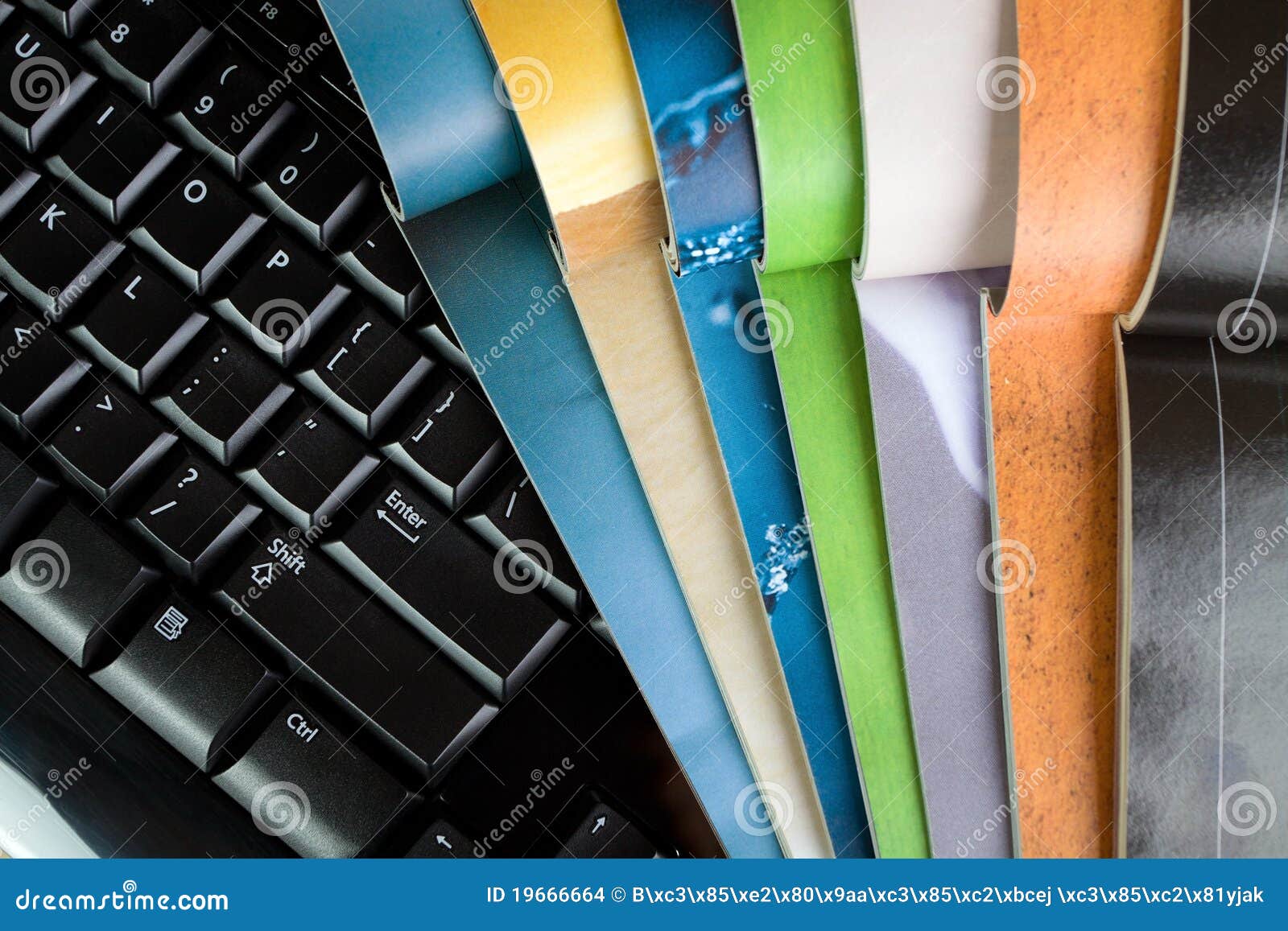 Magazines and computer stock photo. Image of print, heap - 19666664