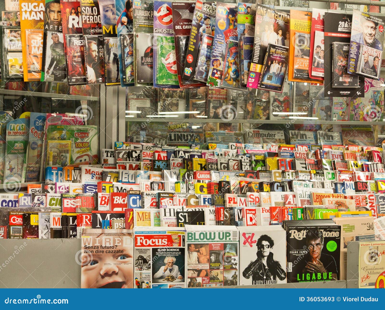 Magazines in press stand editorial stock photo. Image of papers - 36053693
