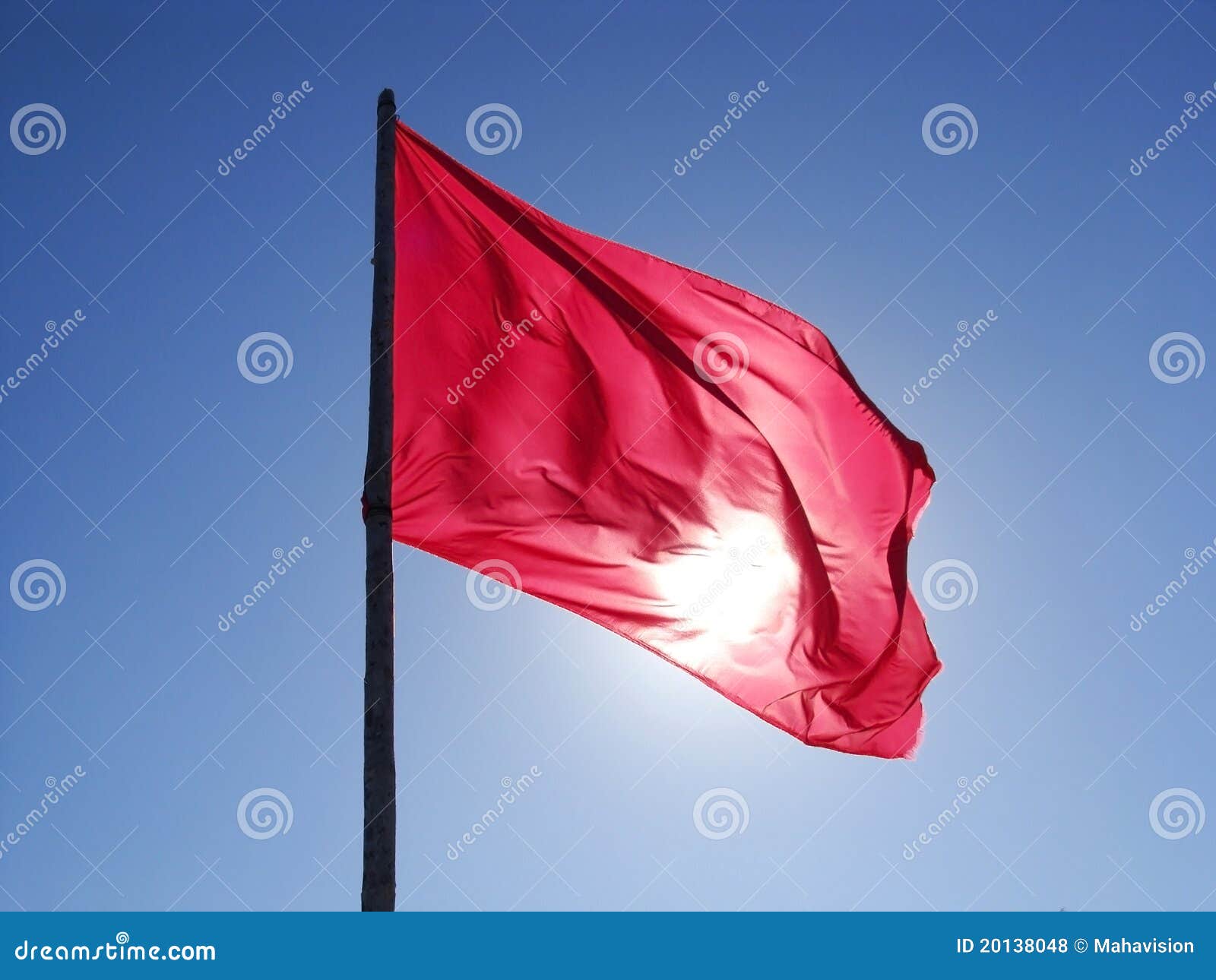 Magenta Flag Flying in a Bright Sky Stock Photo - Image of silhouette ...
