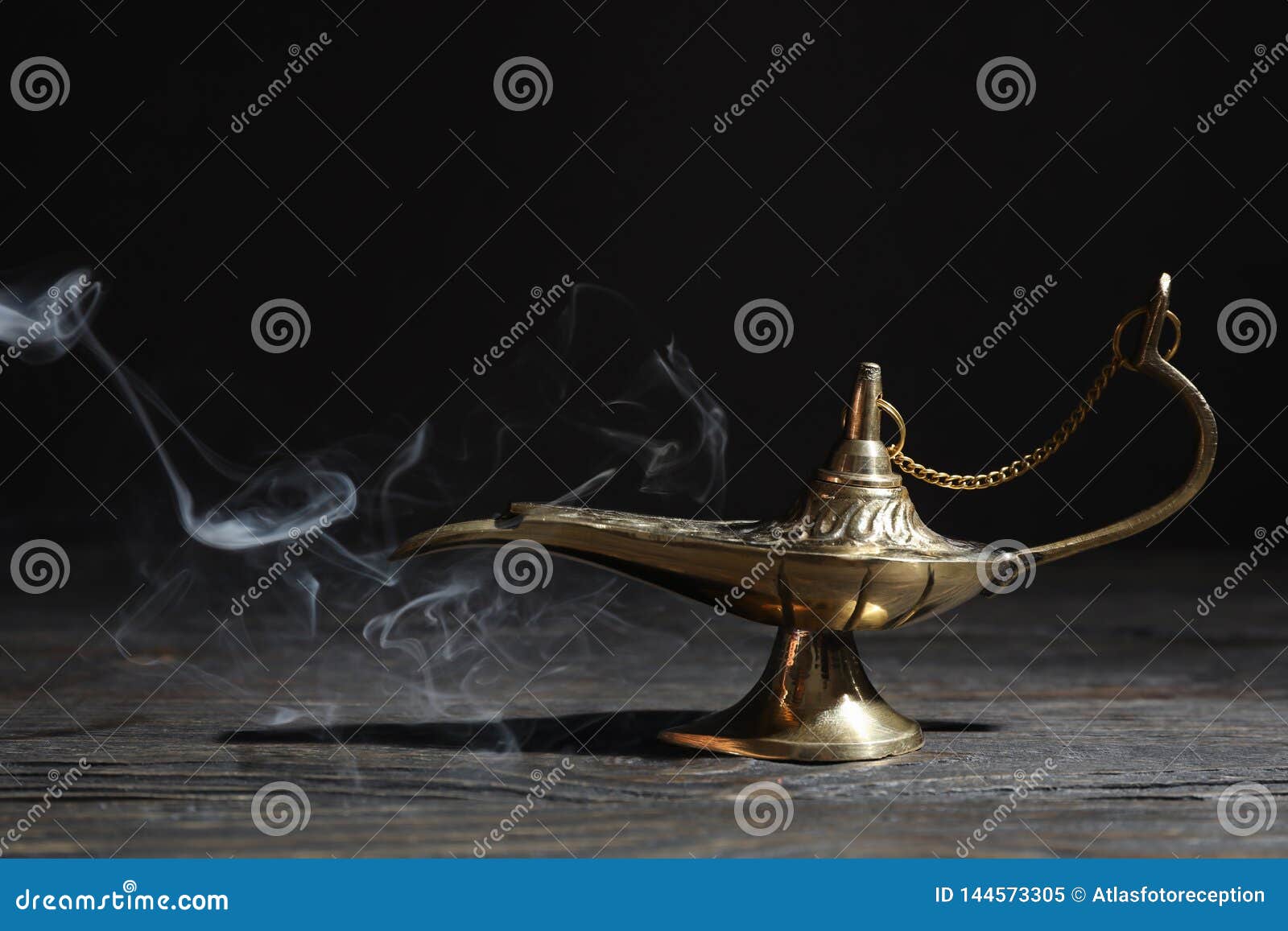 Magic Aladdin Lamp on Wooden Table Stock Image - Image of darkness ...