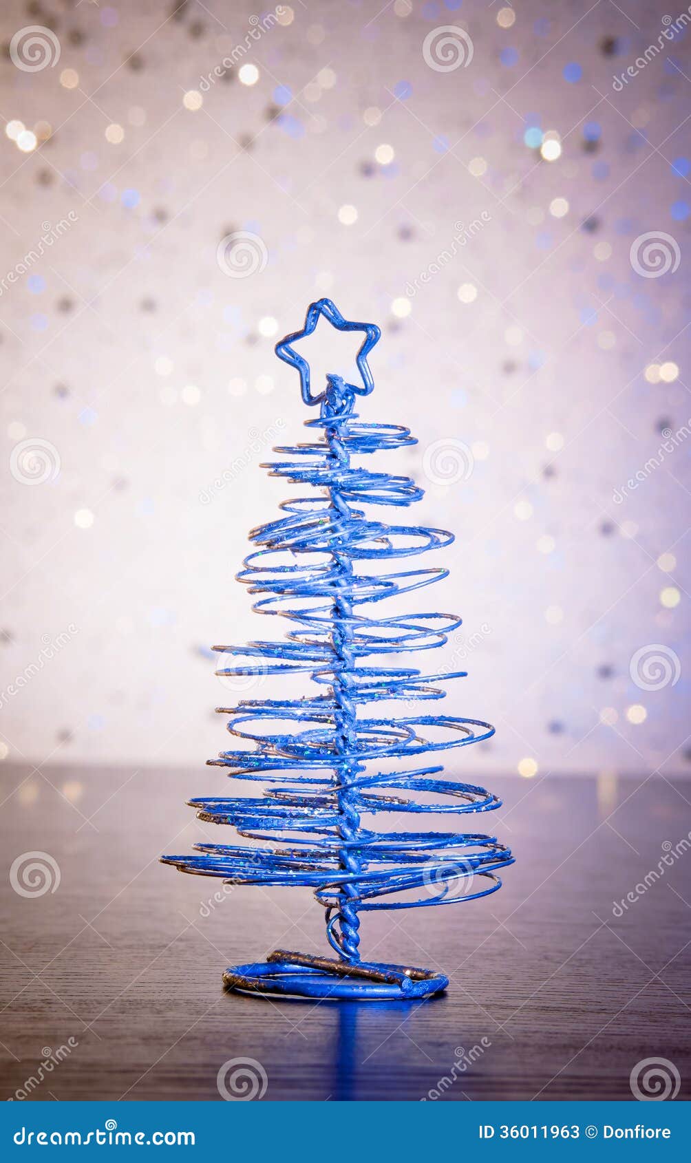 A Magic Blue Metallic Modern Christmas Tree on Wood Table Stock Image ...