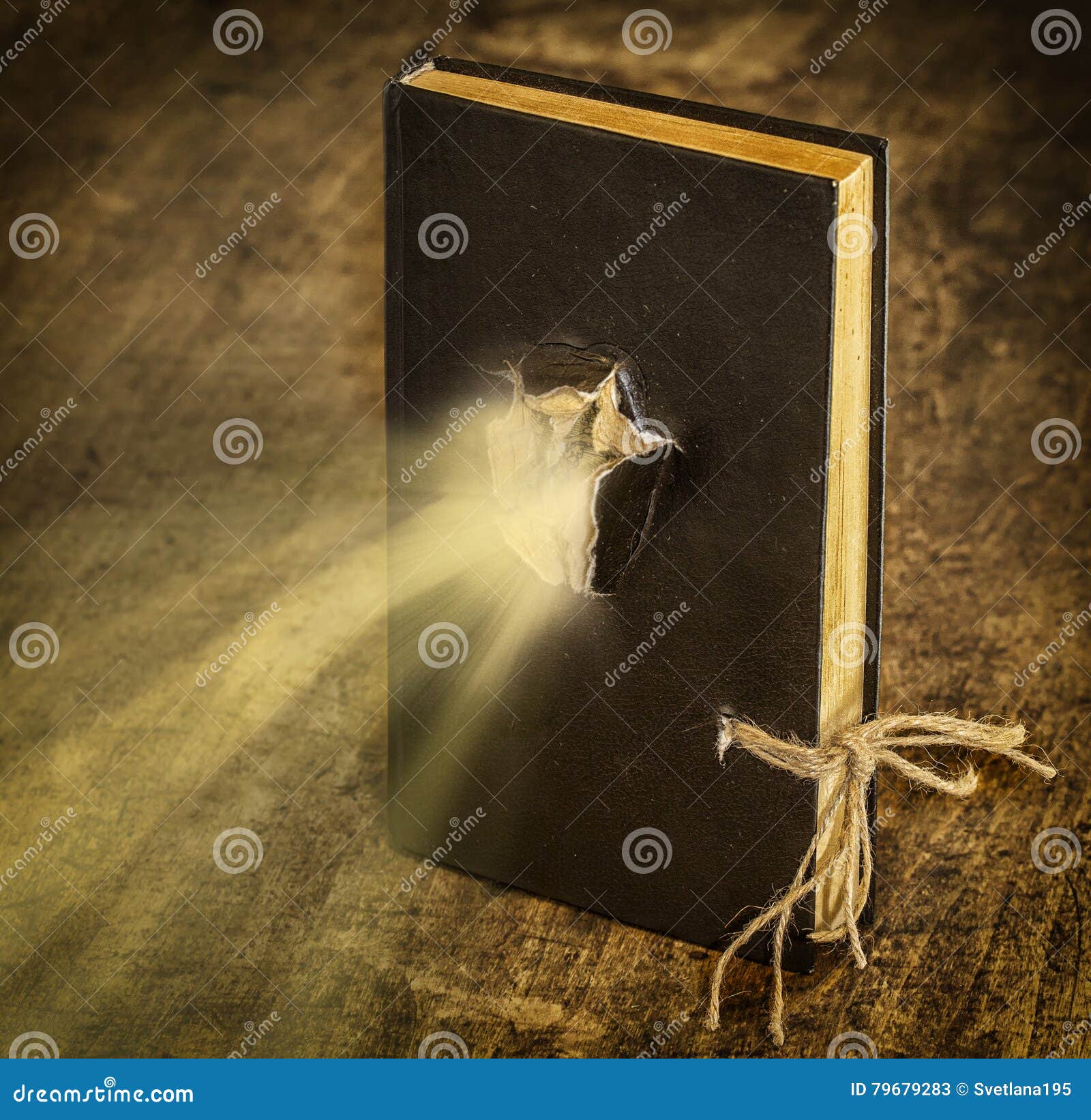 Magic Book Closed on the Rope Emits Light Stock Image - Image of ...