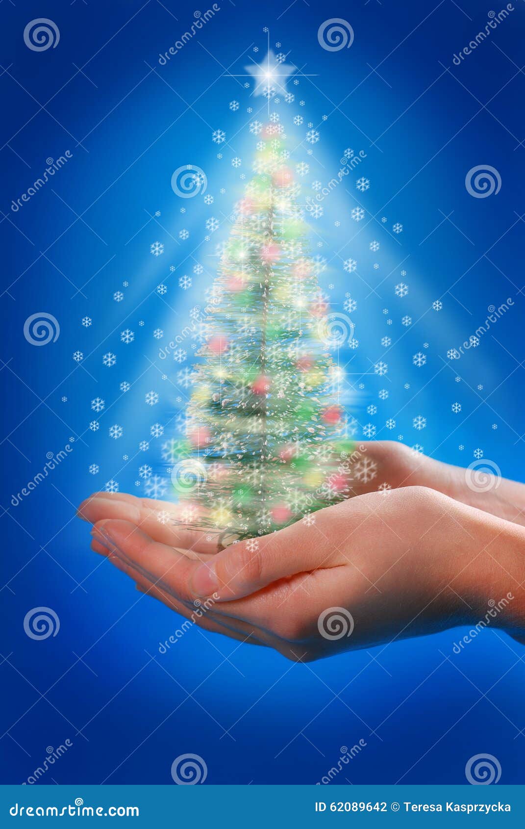 Magic Christmas Tree in Hands Stock Photo - Image of light, holiday ...