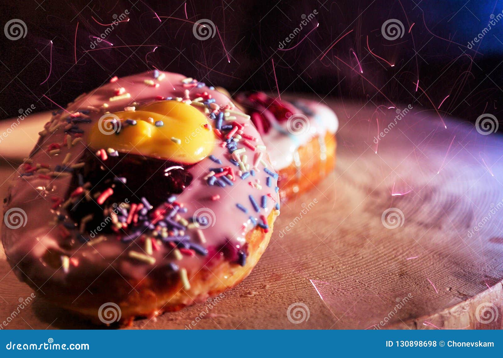 Magic donut with ice cream stock photo. Image of purplelights - 130898698